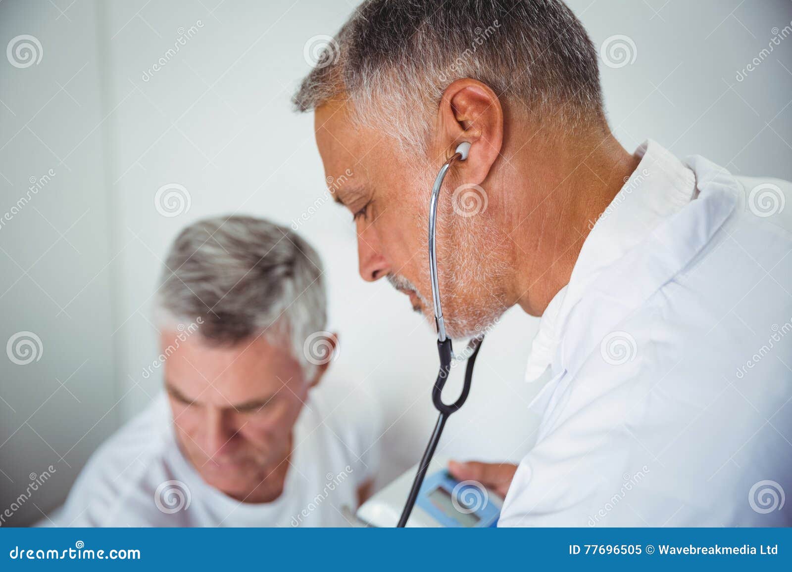 Doctor using stethoscope stock image. Image of citizen - 77696505