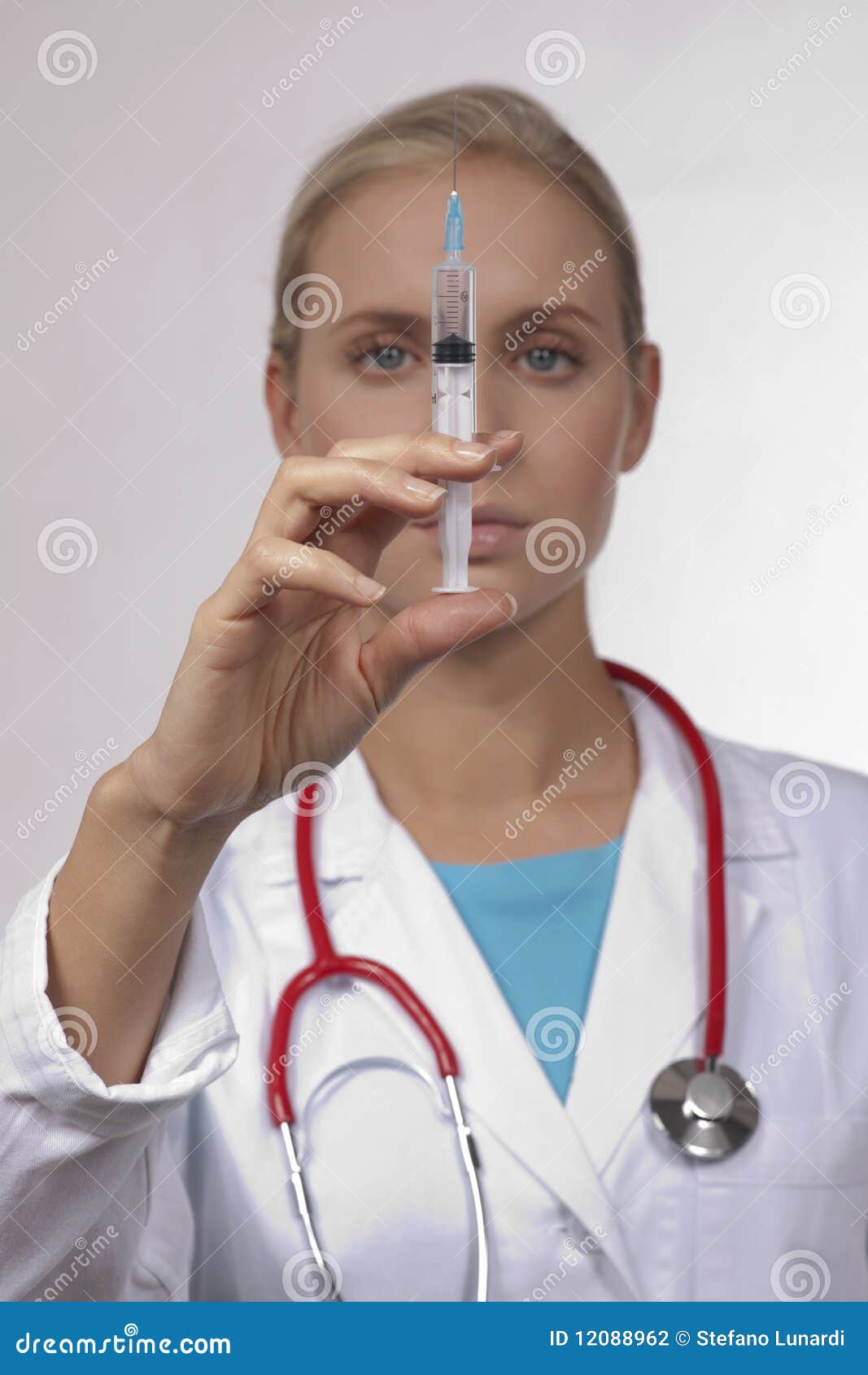 Doctor using a syringe stock photo. Image of doctor, beautiful - 12088962