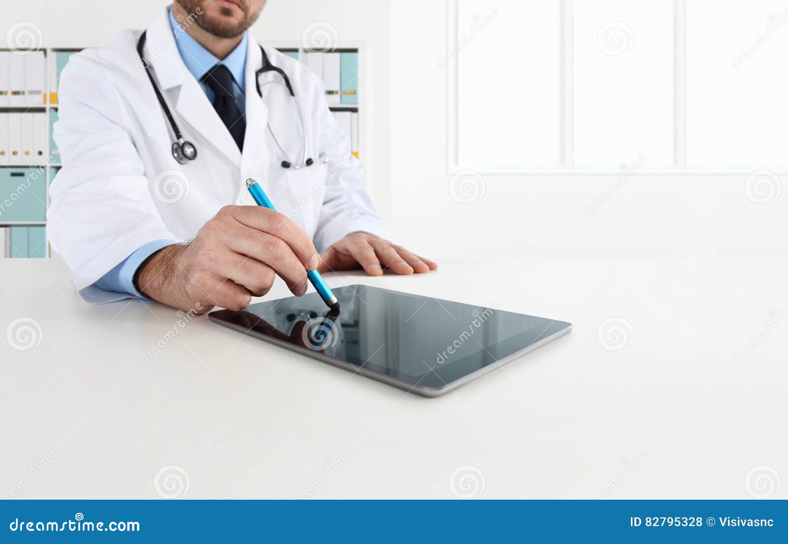 Doctor Using Tablet on Desk Stock Photo - Image of protection, closeup ...
