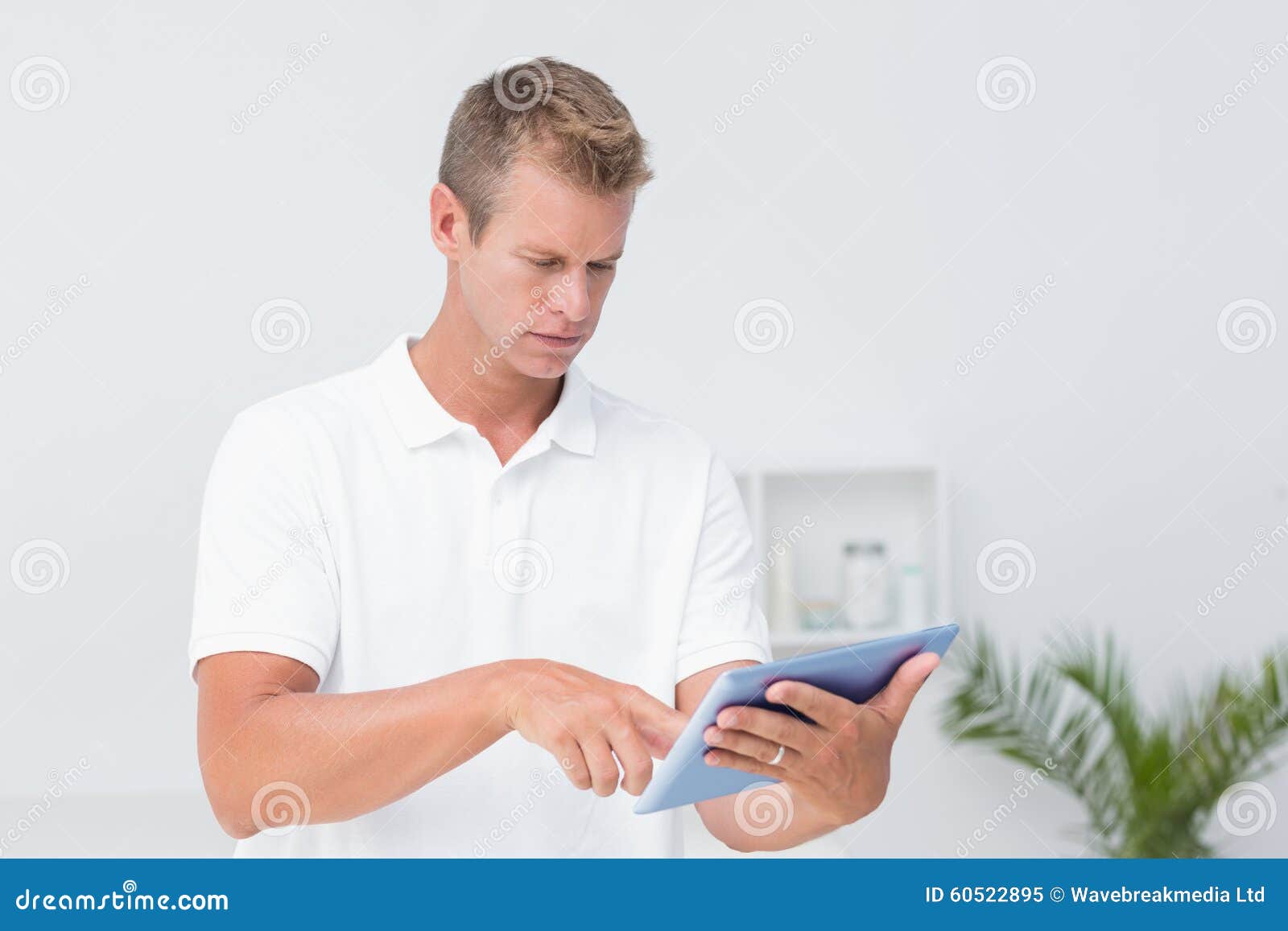 Doctor using tablet pc stock image. Image of touching - 60522895