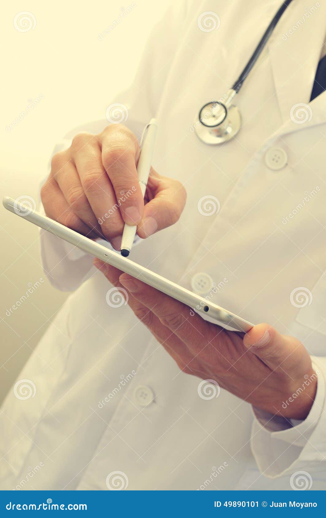 Doctor using a tablet stock image. Image of practitioner - 49890101