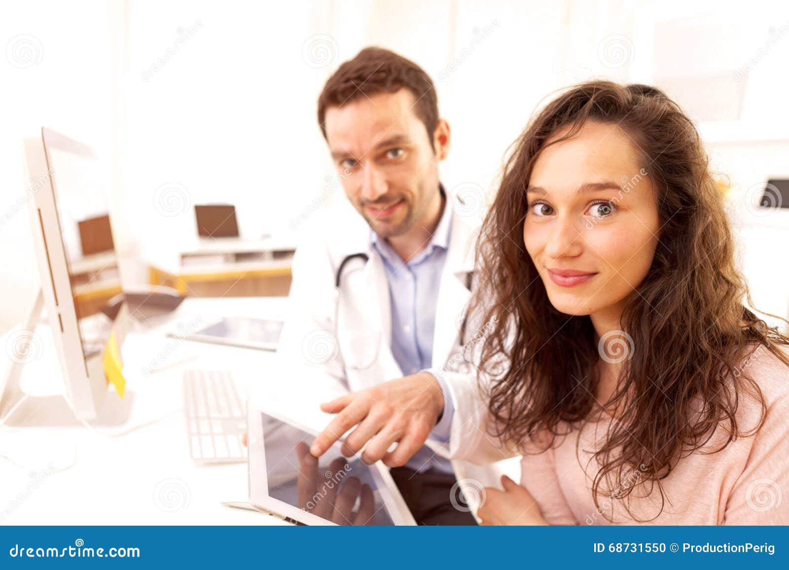Doctor Using Tablet To Inform Patient Stock Photo - Image of laptop ...
