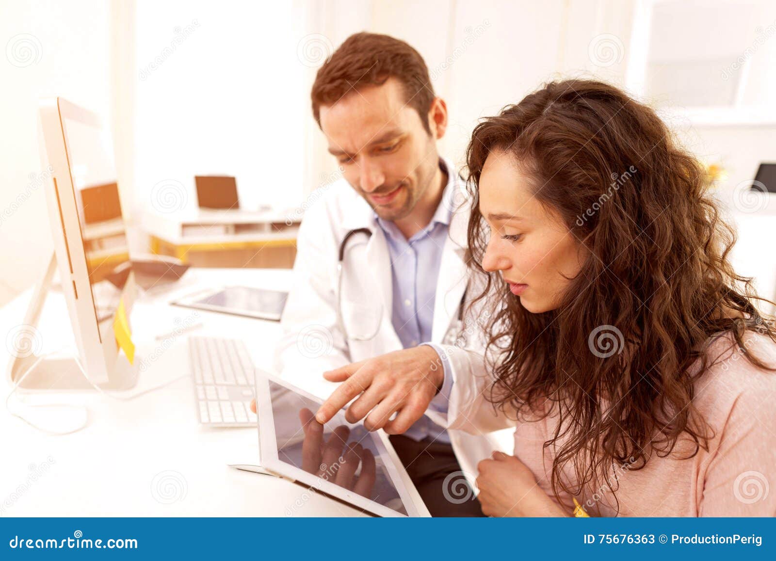 Doctor Using Tablet To Inform Patient Stock Image - Image of ...