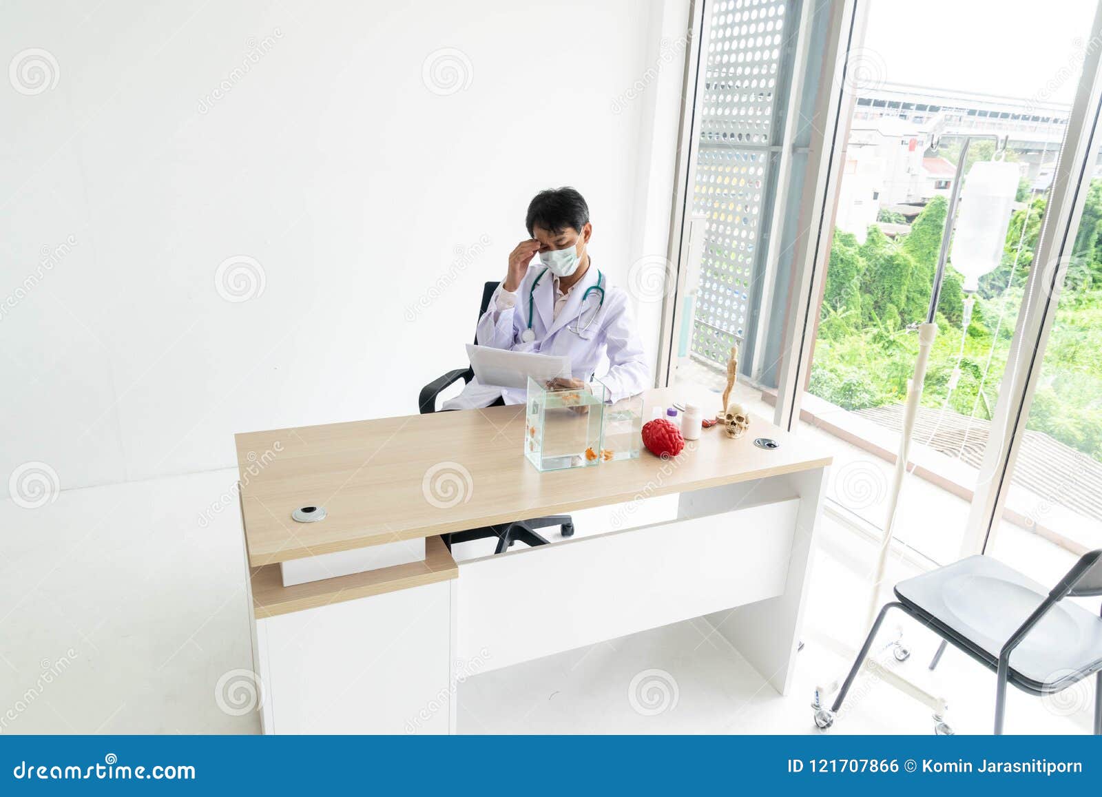 The Doctor is Viewing His Report. Stock Photo - Image of stethoscope ...