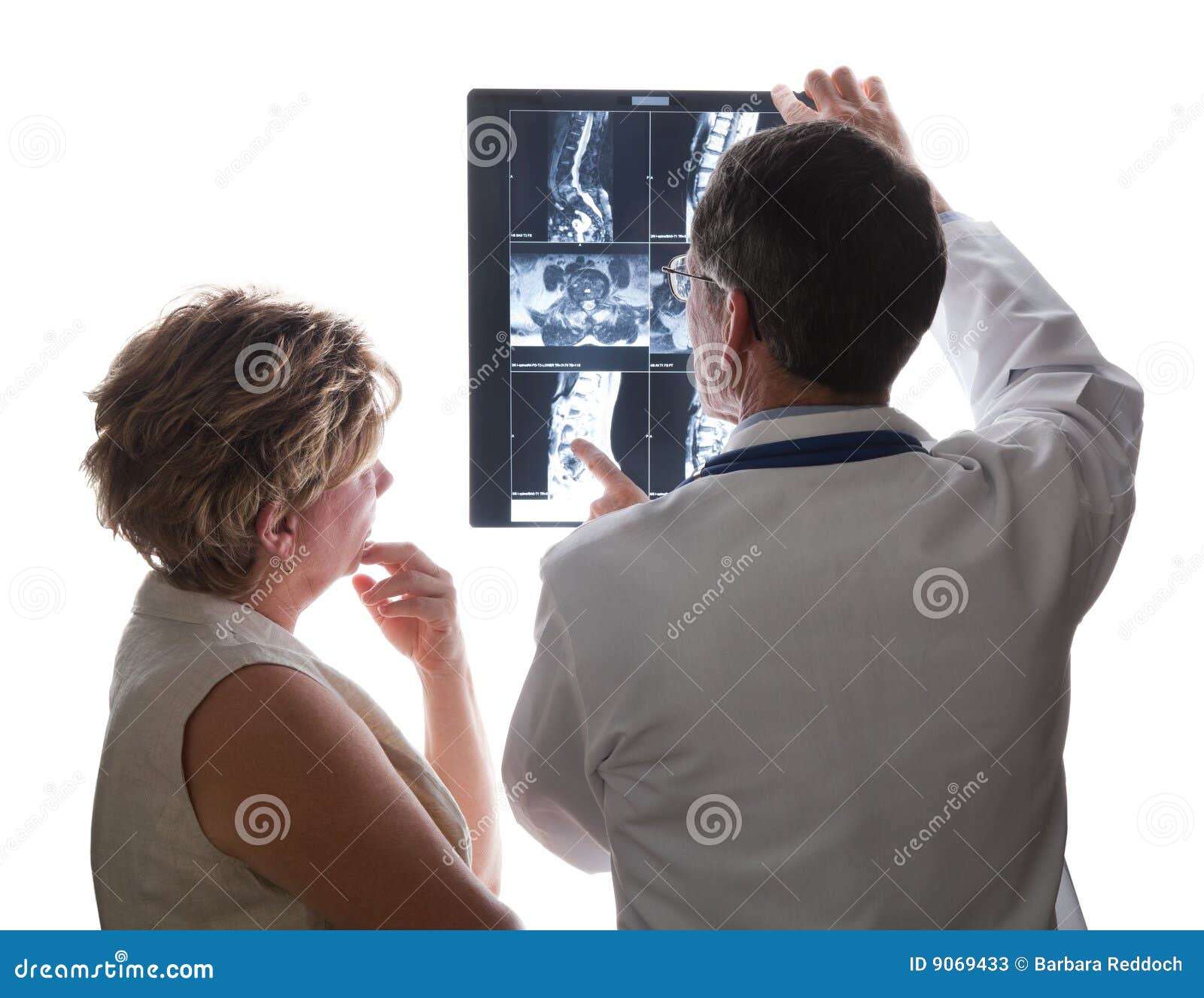 Doctor Viewing Scans with Patient Stock Image - Image of office ...