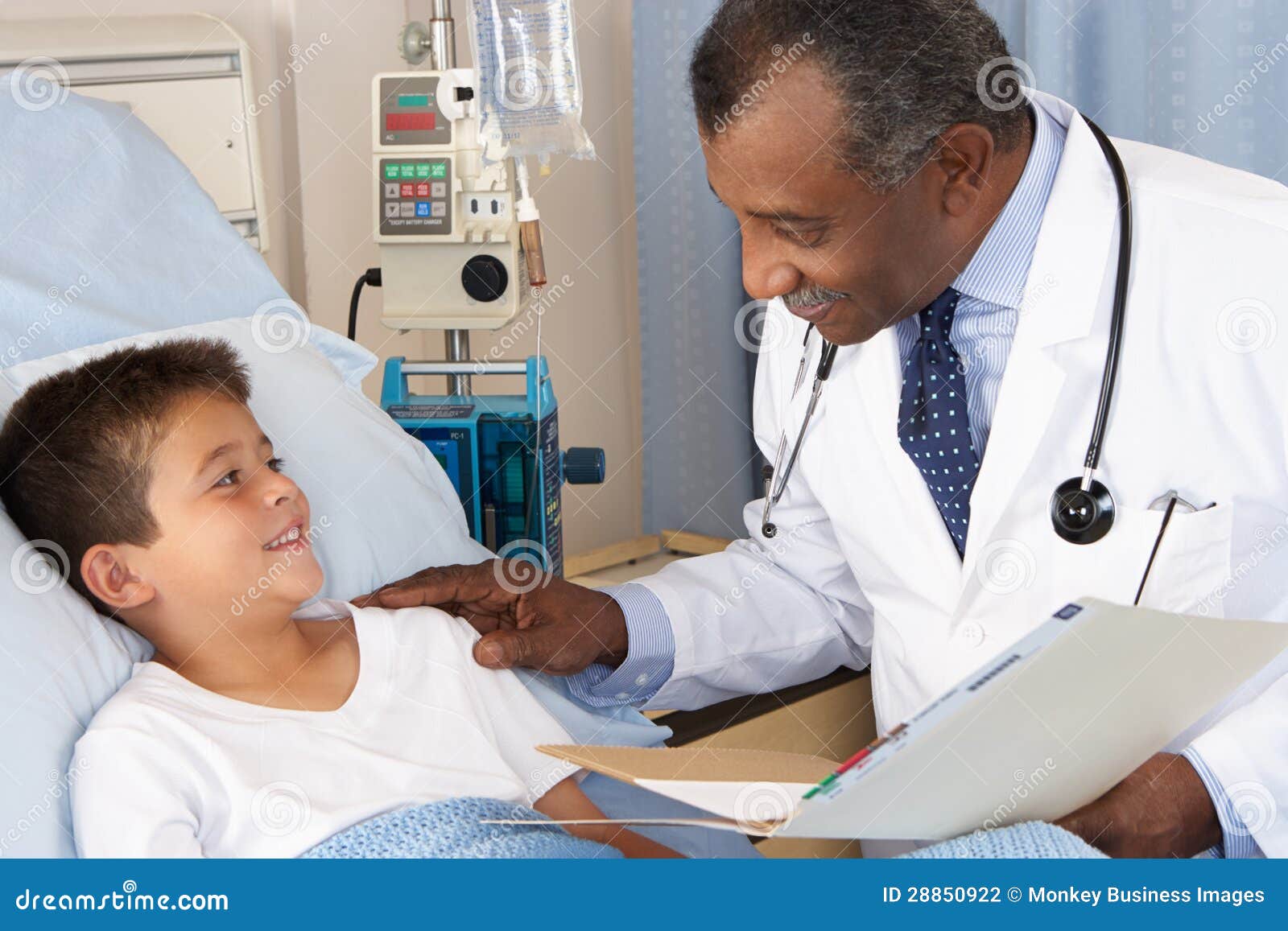 Doctor Visiting Child Patient on Ward Stock Photo - Image of hispanic ...