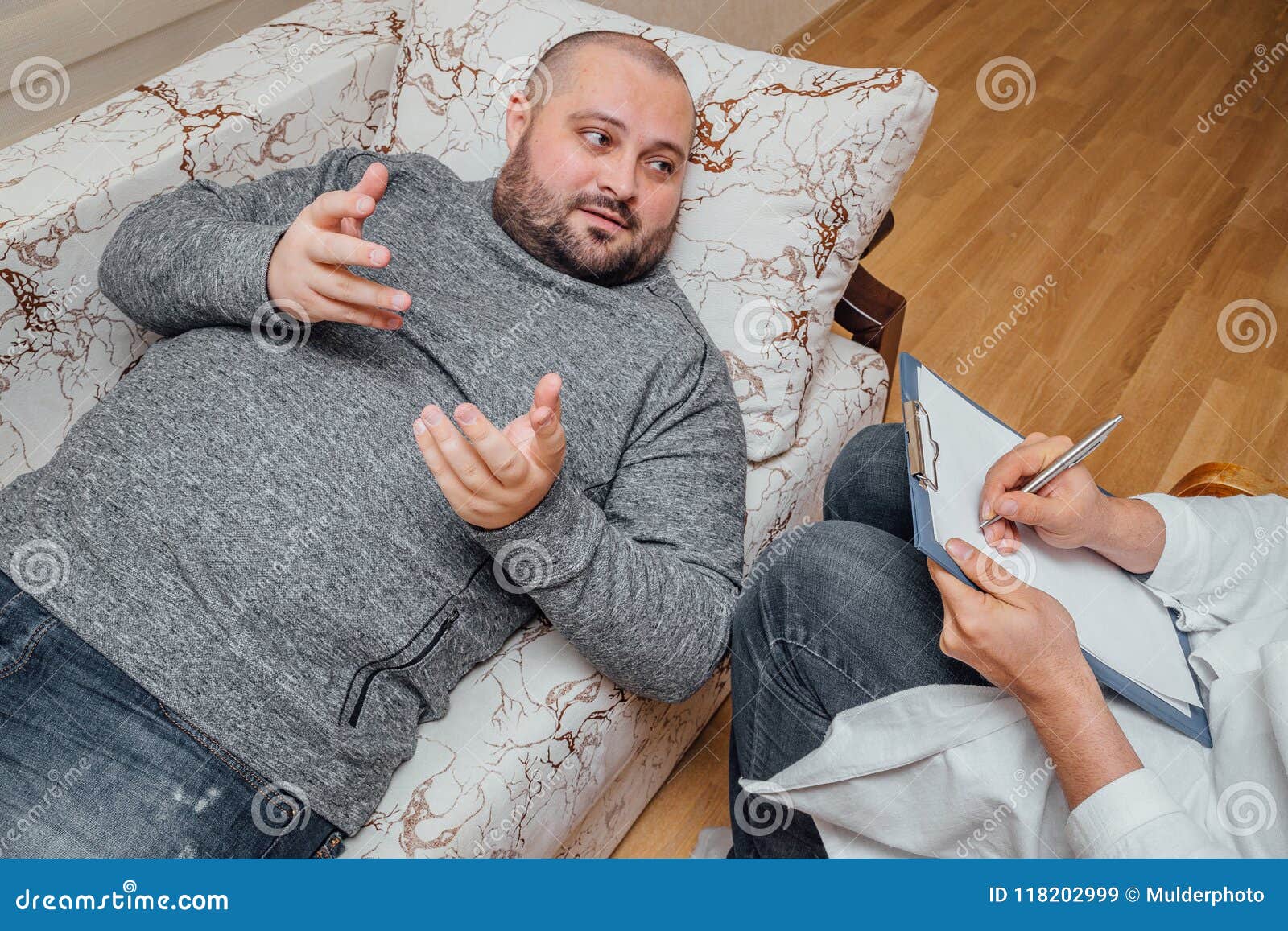 Doctor Visits His Patient. Sick Sad Man Talking with Doctor about His ...