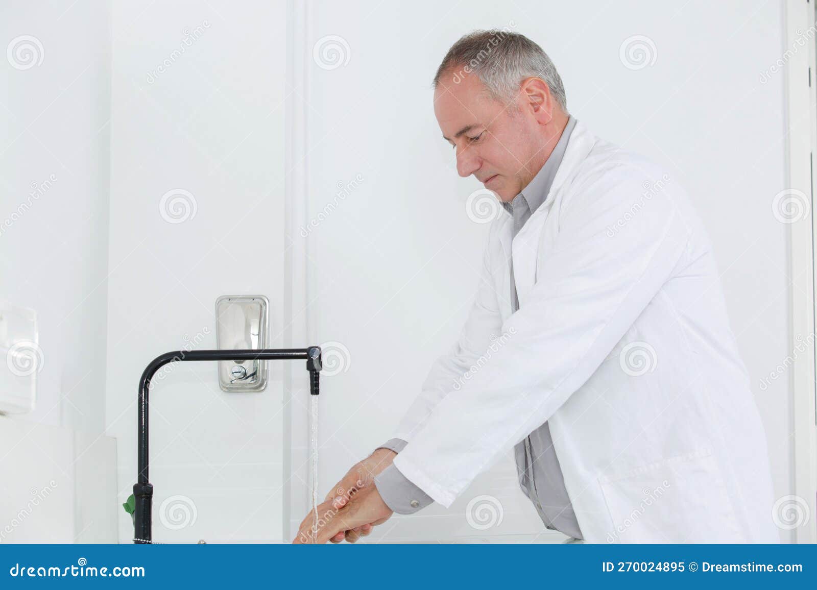 Doctor washing hands stock image. Image of employee - 270024895