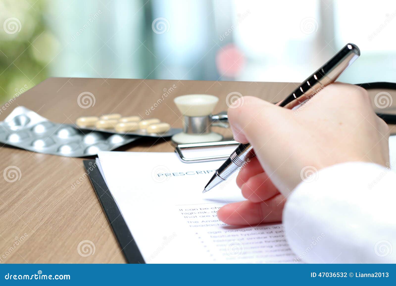 Doctor in a White Labcoat Writing Out RX Prescription Stock Photo ...