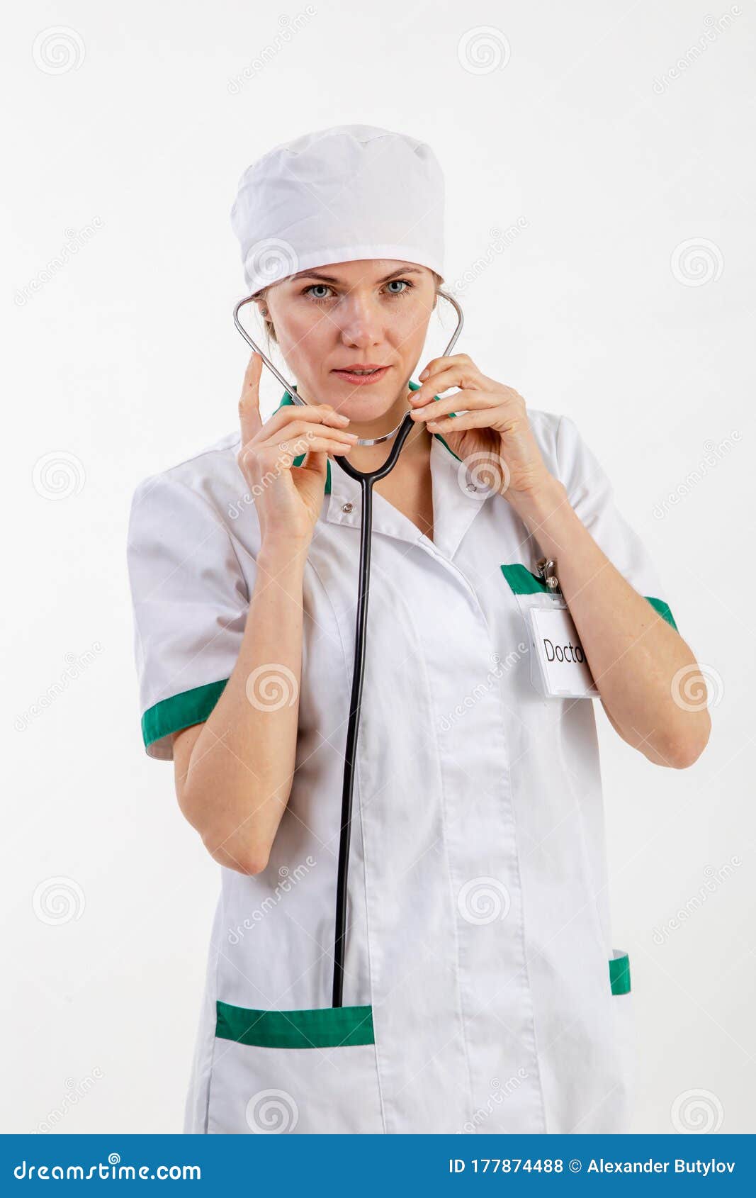 Doctor in a White Robe with a Stethoscope in His Hands Stock Photo ...