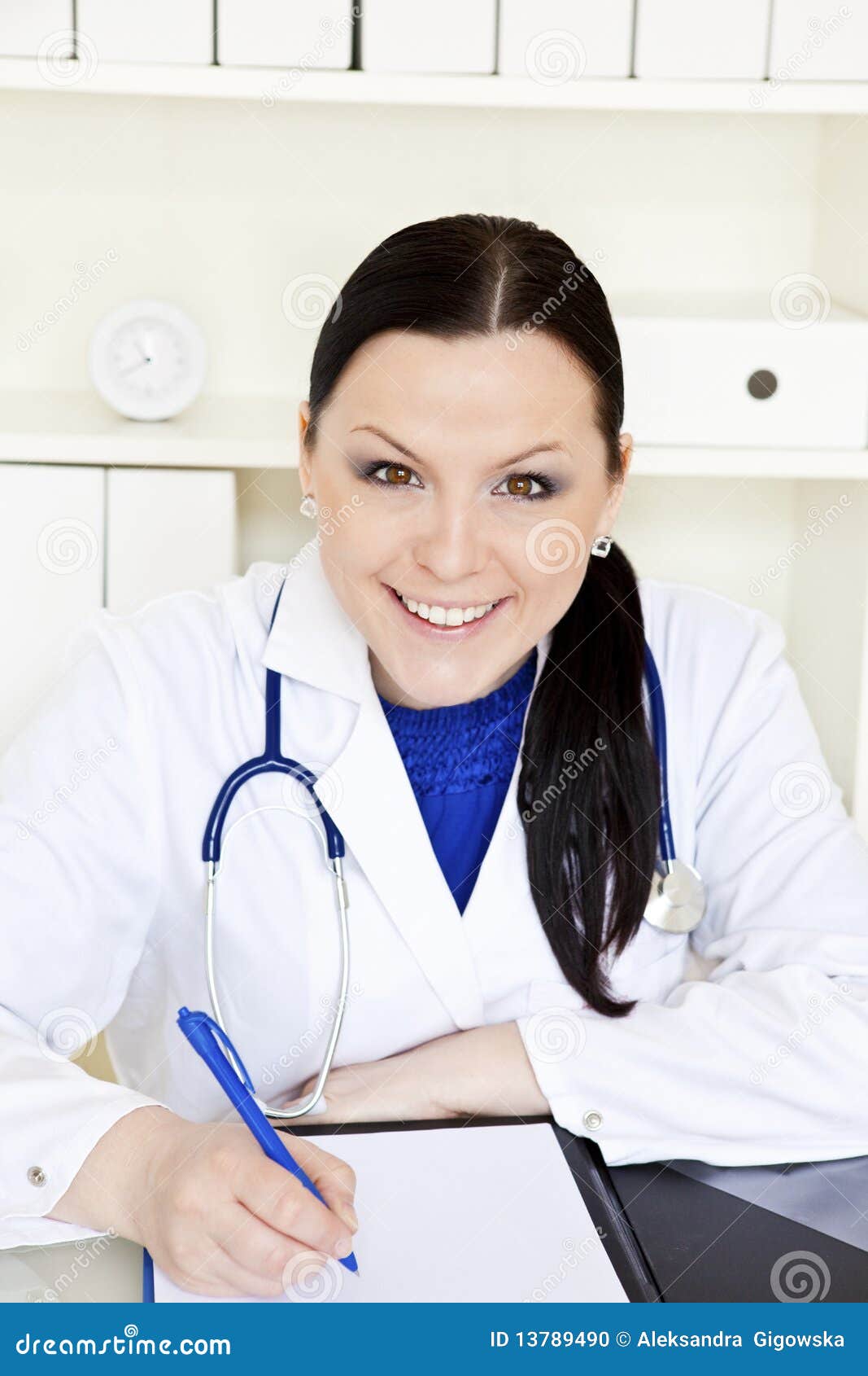 Doctor Woman Making Notes in Surgery Stock Photo - Image of smile, care ...