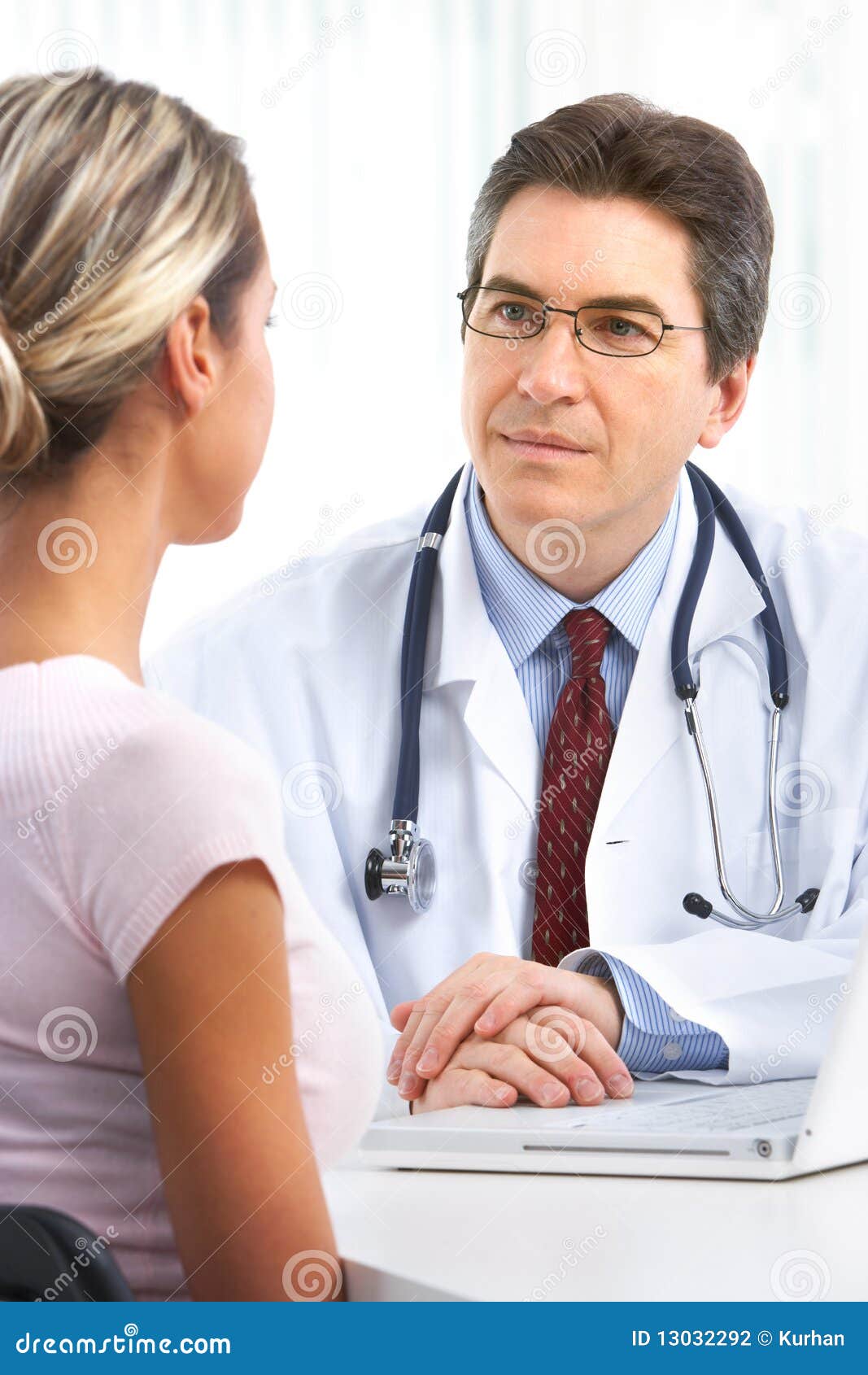 Doctor and woman patient stock photo. Image of isolate - 13032292