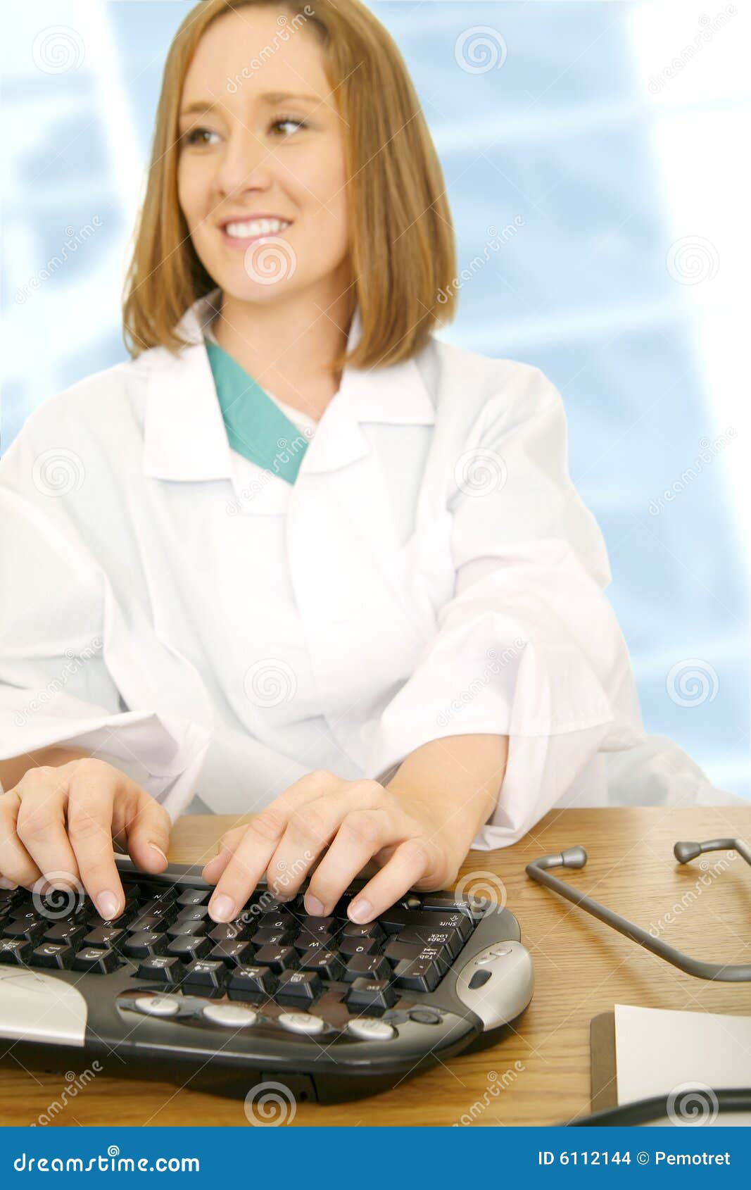 Doctor Woman Typing stock photo. Image of beautiful, light - 6112144