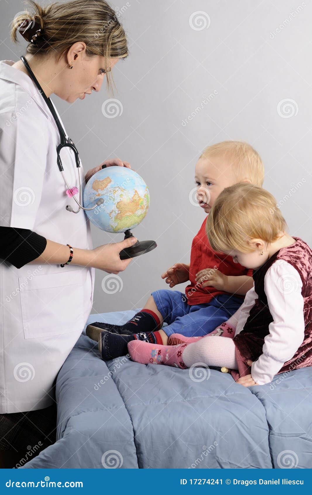Doctor Working with Children Stock Image - Image of studio, medicine ...