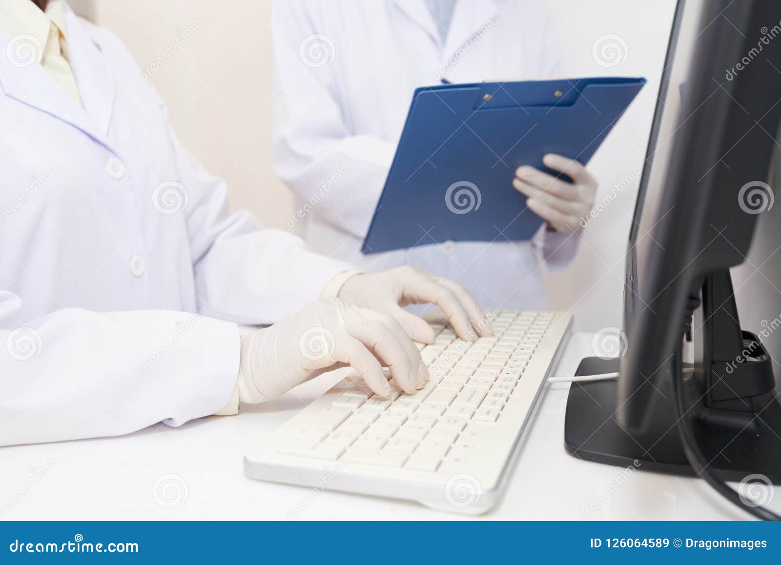 Doctor working on computer stock image. Image of clinic - 126064589