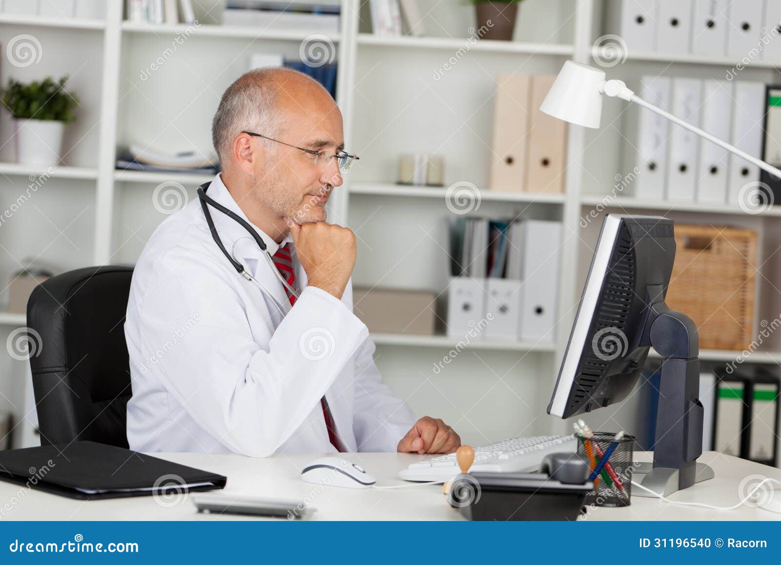 Doctor Working with Computer Stock Photo - Image of desk, computer ...
