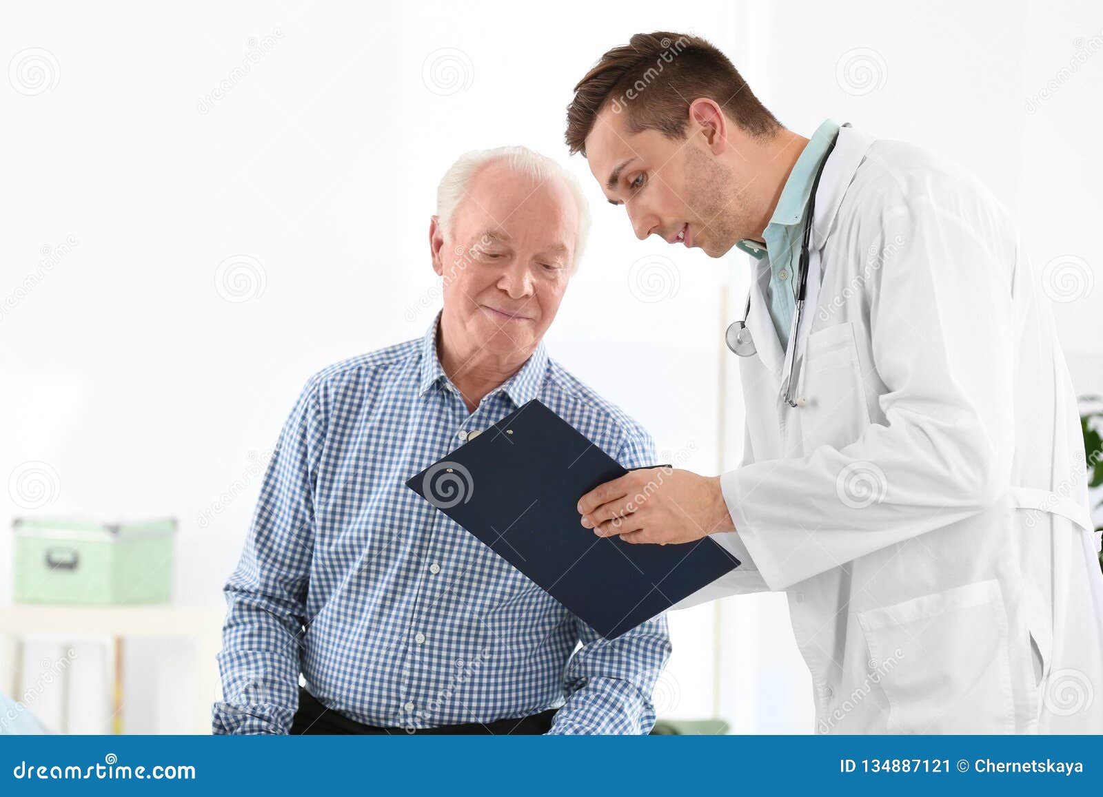 Doctor Working with Elderly Patient Stock Image - Image of people ... Doctor Working with Elderly Patient Stock Image - Image of people ...