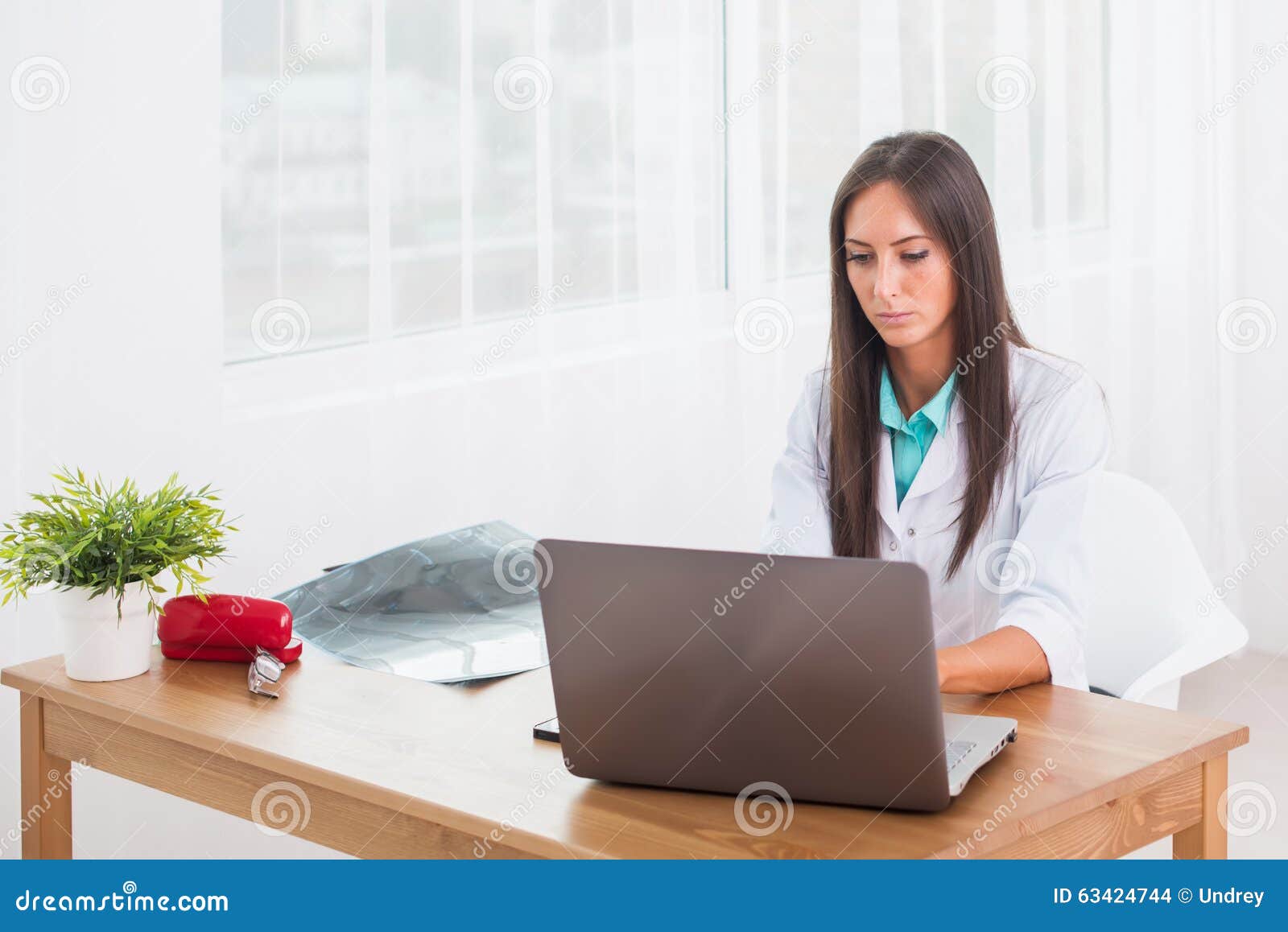 Doctor Working with Laptop Computer in Medical Stock Photo - Image of ...
