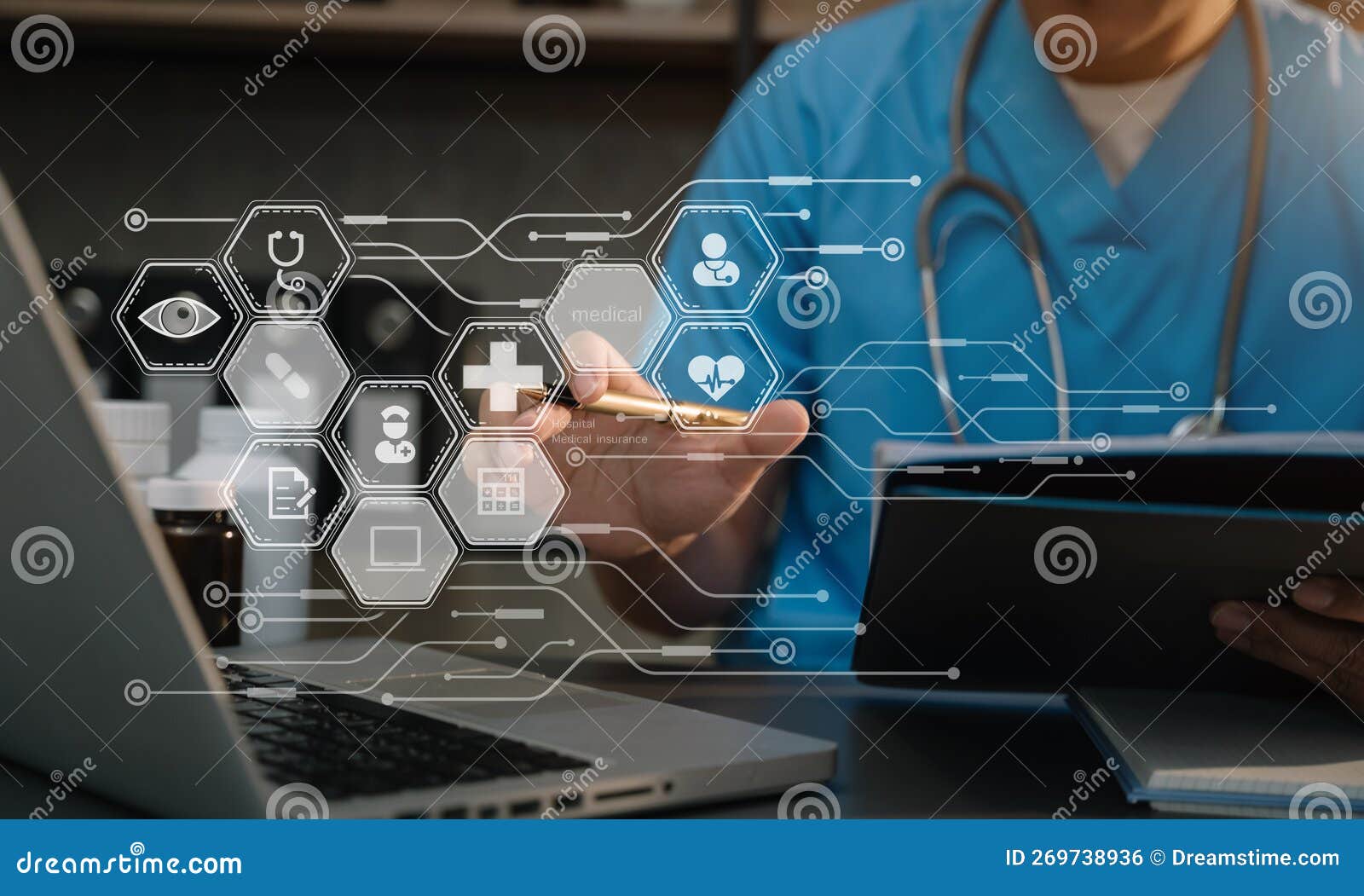 Doctor Working with Laptop Computer and Writing on Paperwork Stock ...