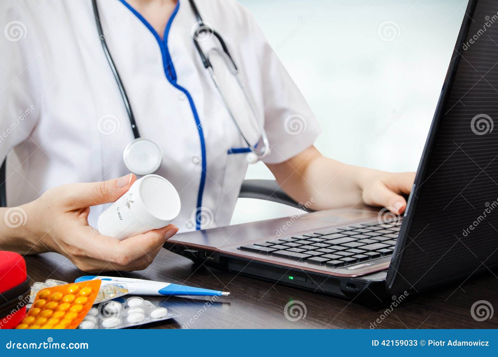 Doctor working with laptop stock image. Image of practice - 42159033