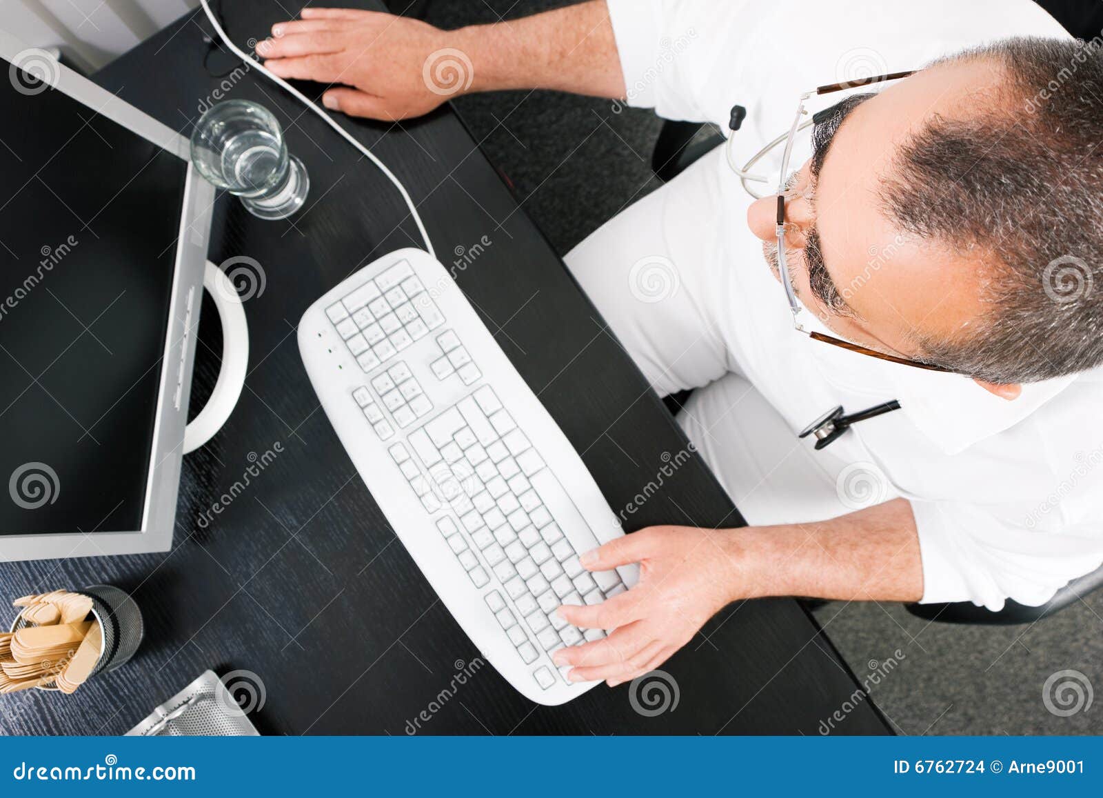 Doctor working at the PC stock photo. Image of analyze - 6762724