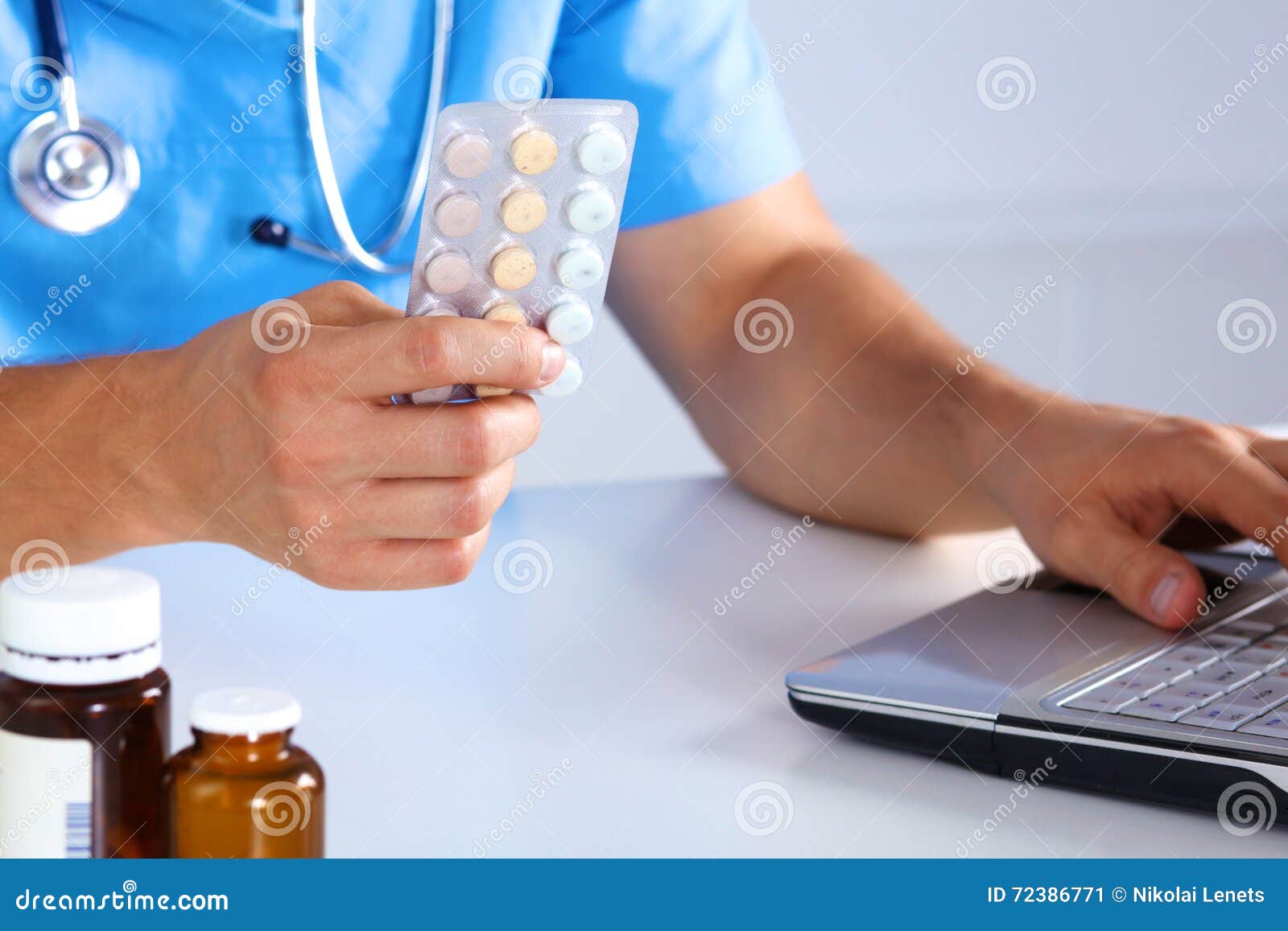 The Doctor Writes a Prescription Pill on the Computer Stock Image ...