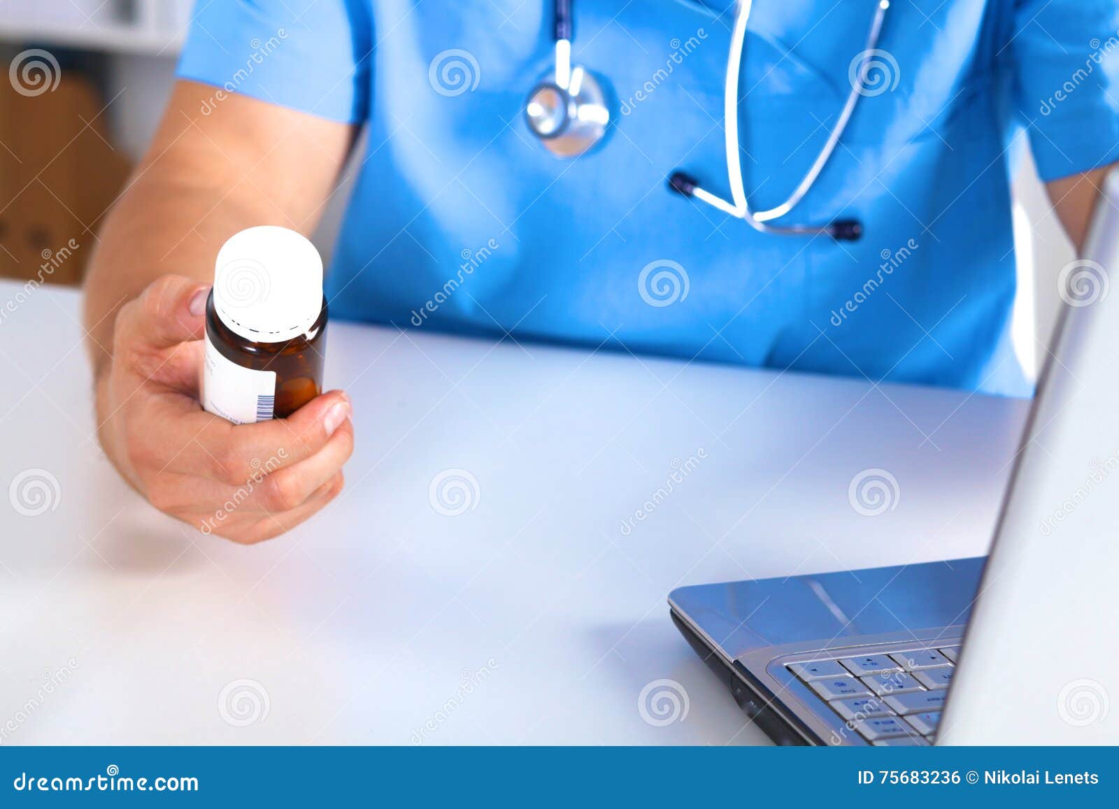The Doctor Writes a Prescription Pill on the Computer Stock Photo ...