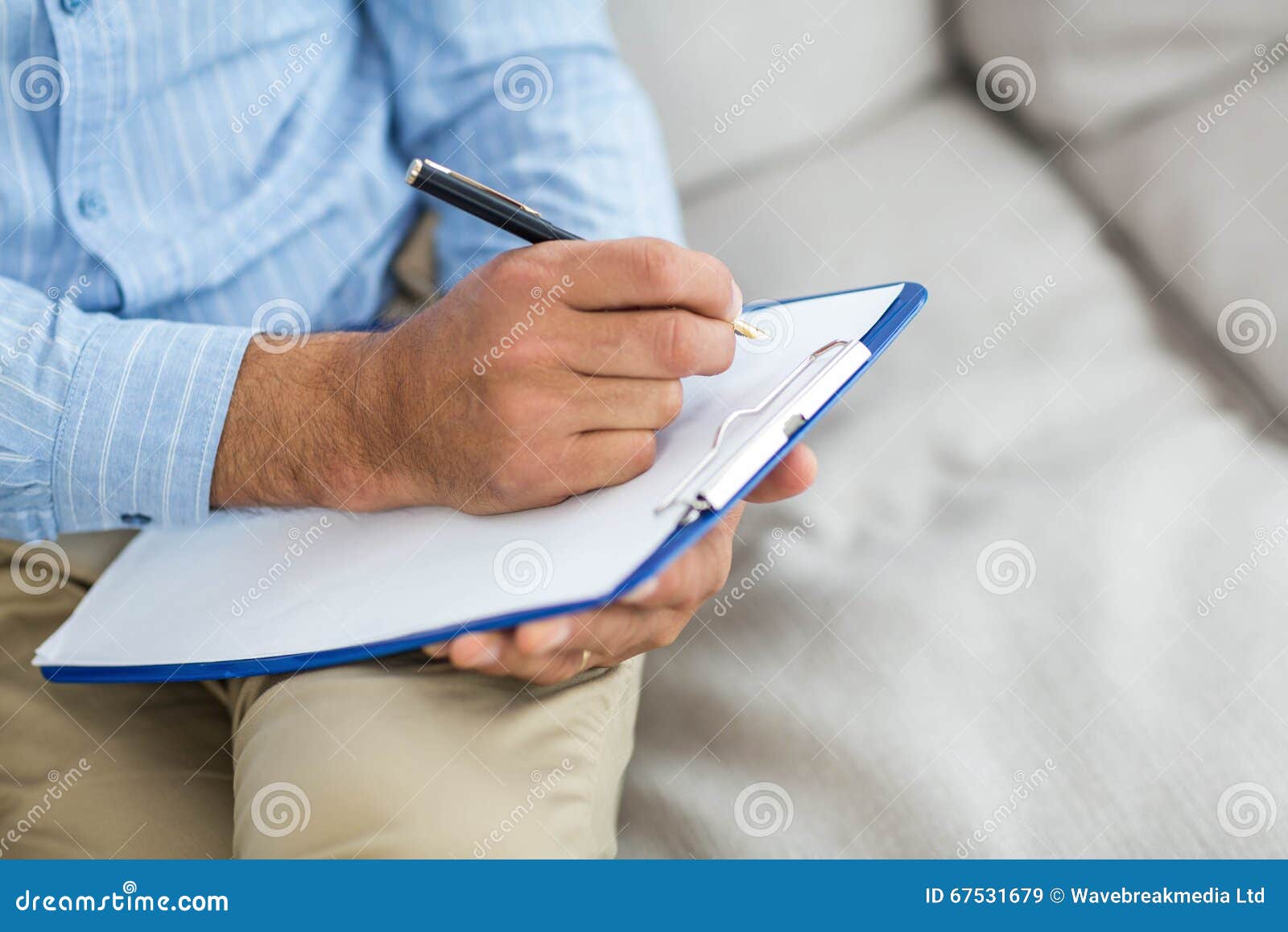 Doctor Writing on Clipboard Stock Image - Image of formal, homey: 67531679