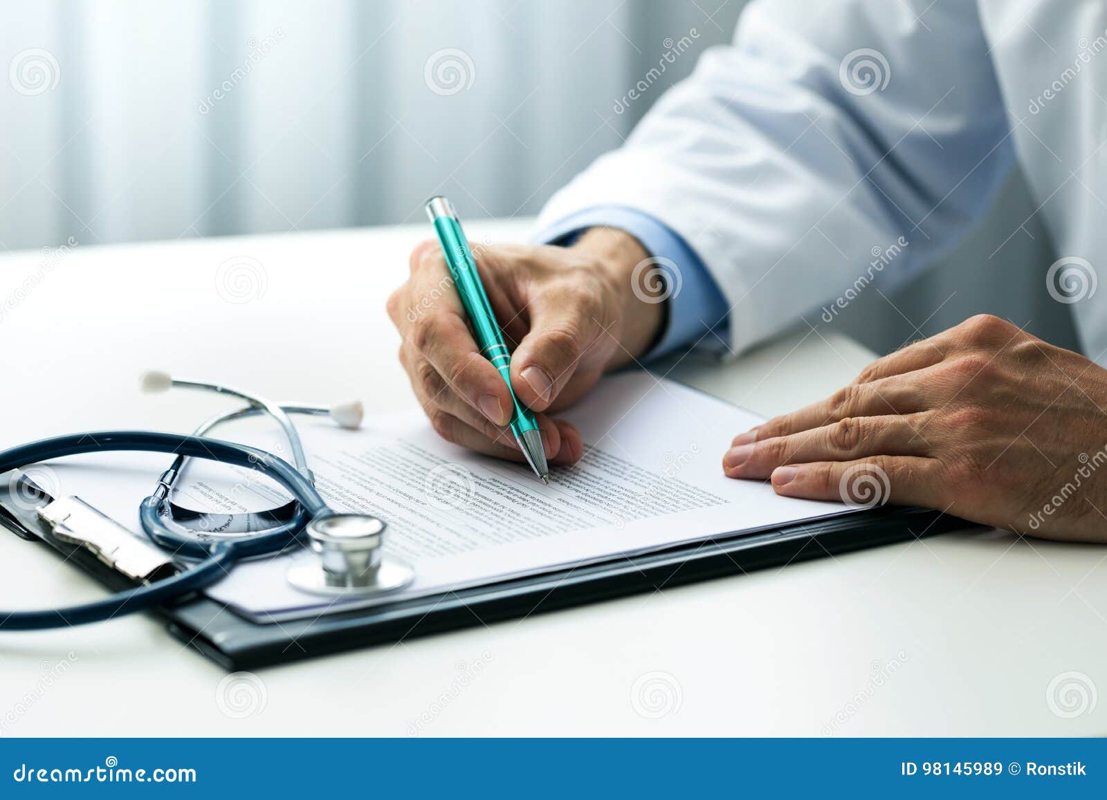 Doctor Writing Documents in Clinics Office Stock Image - Image of care ...