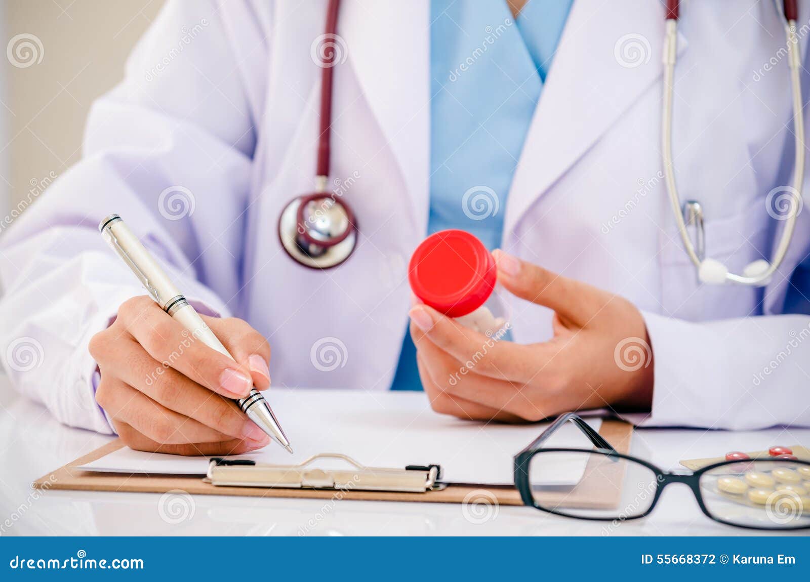 Doctor Writing Medical Record Stock Photo - Image of healthcare ...