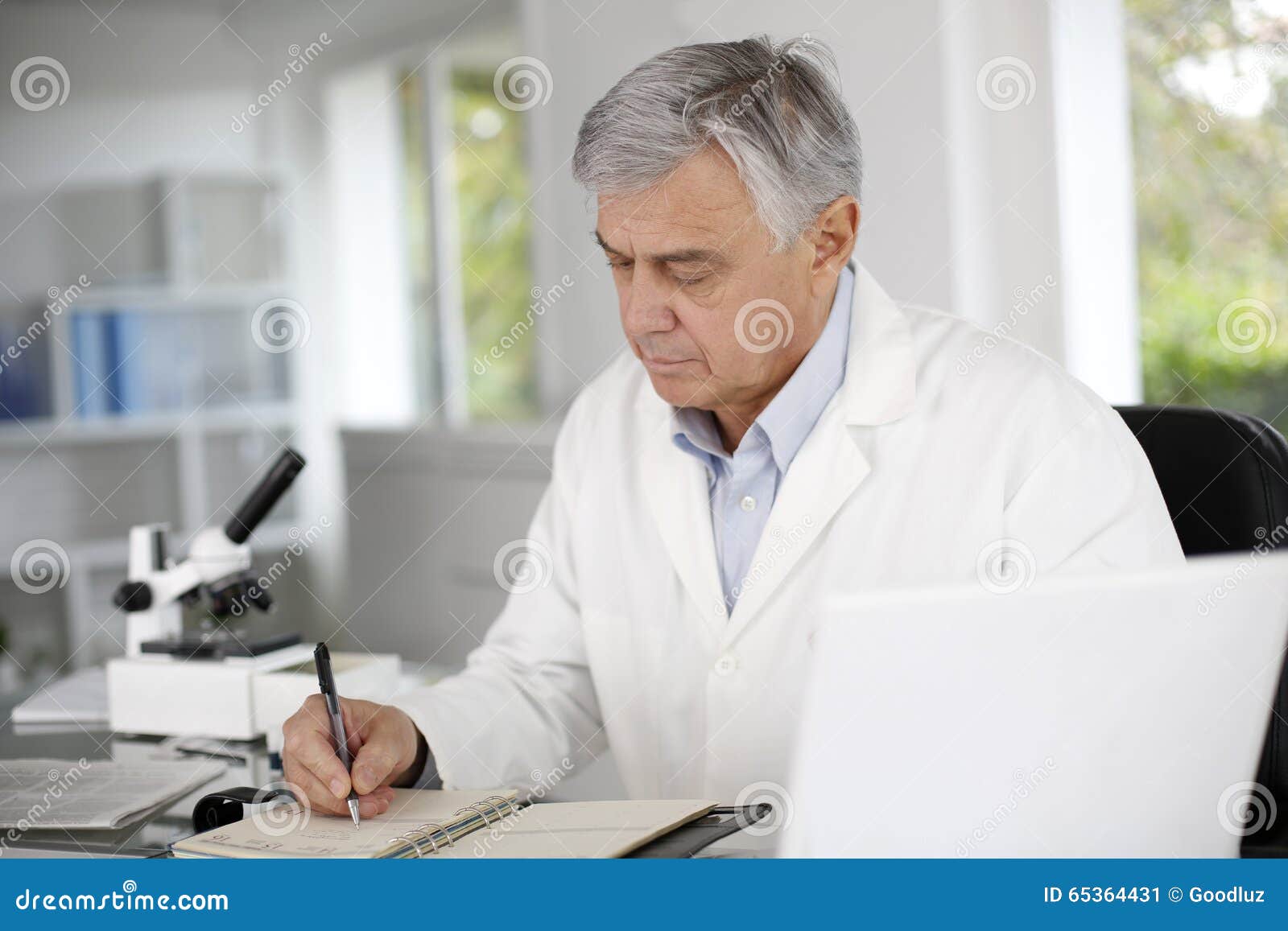 Doctor Writing Notes in Laboratory Stock Image - Image of agenda ...