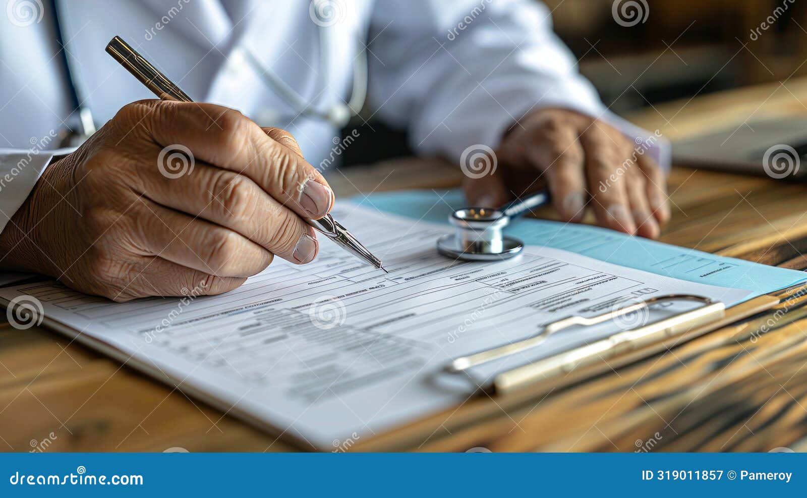 A Doctor Writing Notes on a Medical Chart with a Stethoscope on the ...