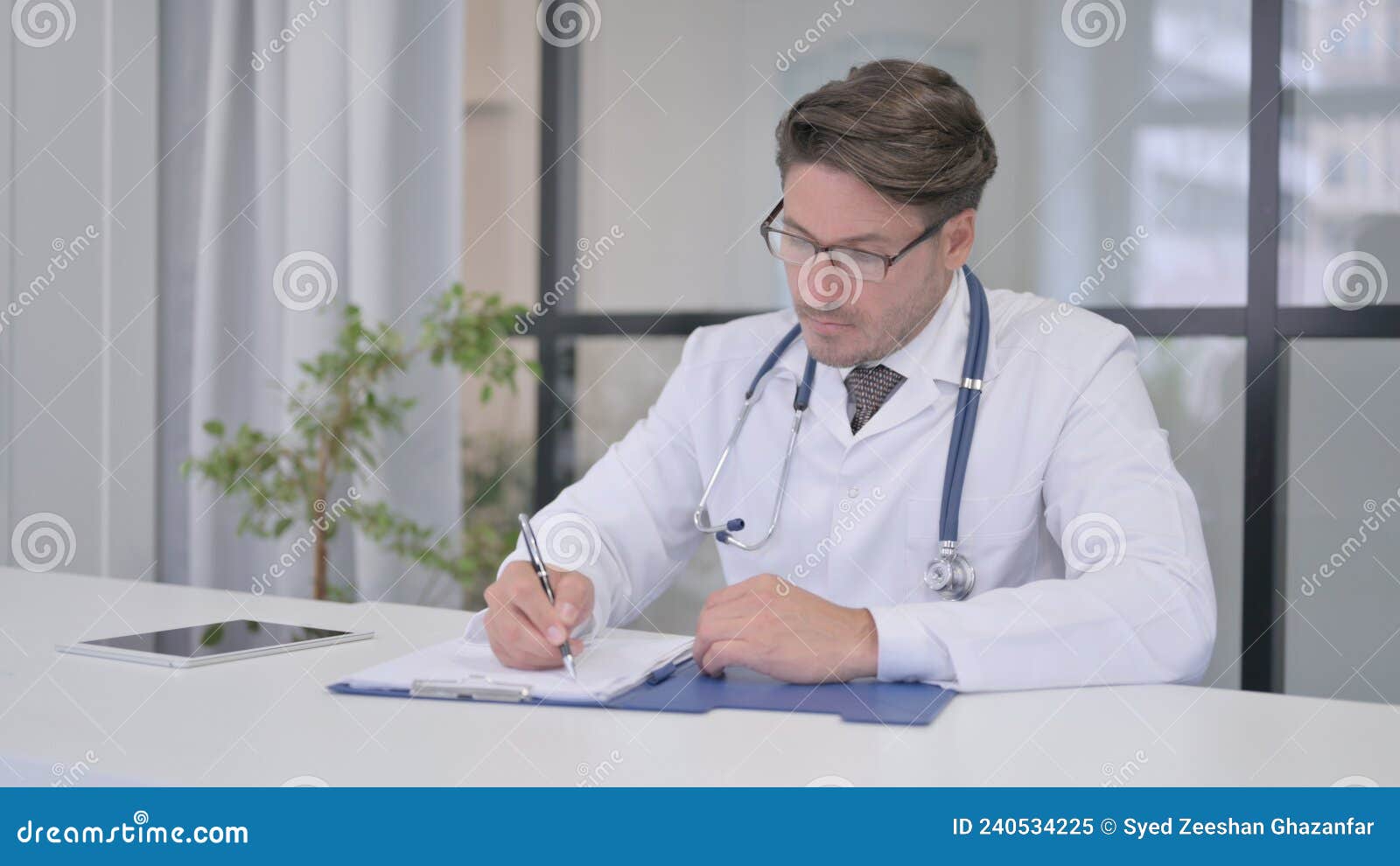 Doctor Writing on Paper in Clinic Stock Image - Image of illness ...