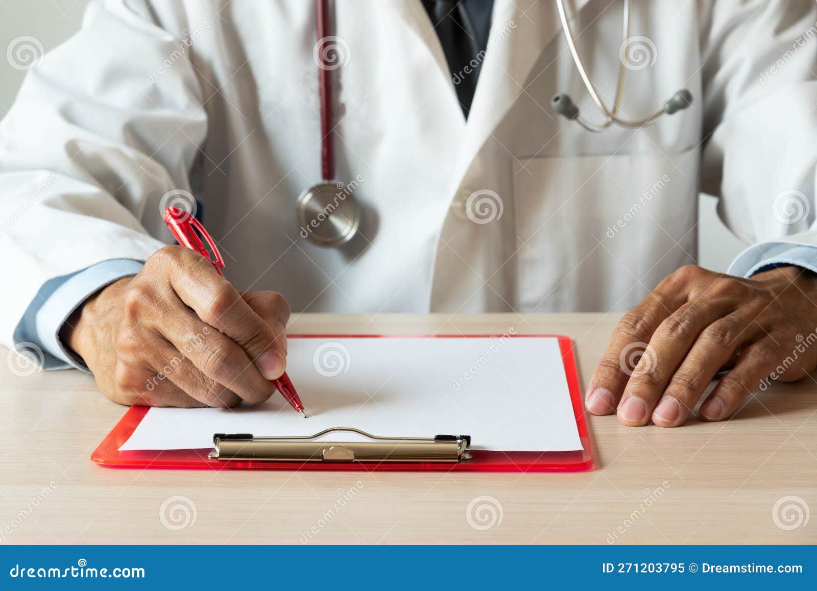 Doctor Writing on Paper Document in Medical Office Stock Image - Image ...
