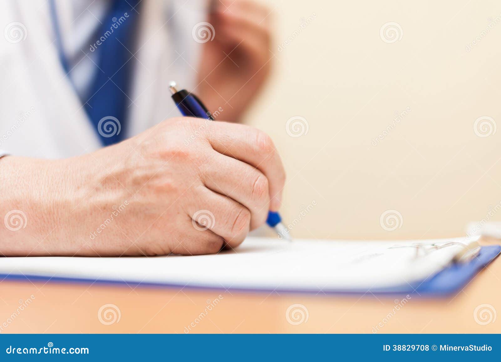 Doctor Writing a Prescription in His Studio Stock Photo - Image of ...