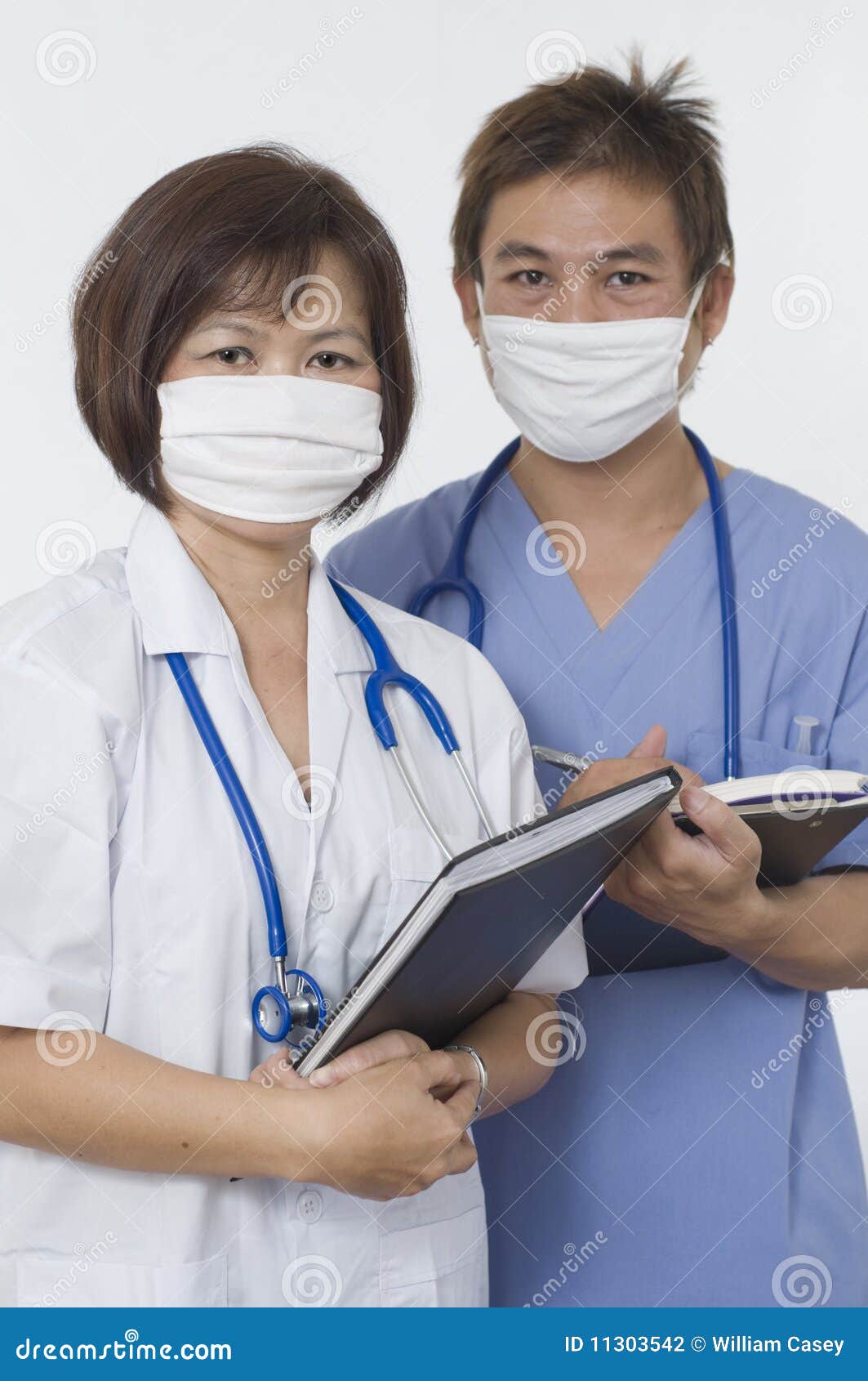 Doctorn and Intern stock photo. Image of friendly, writing - 11303542