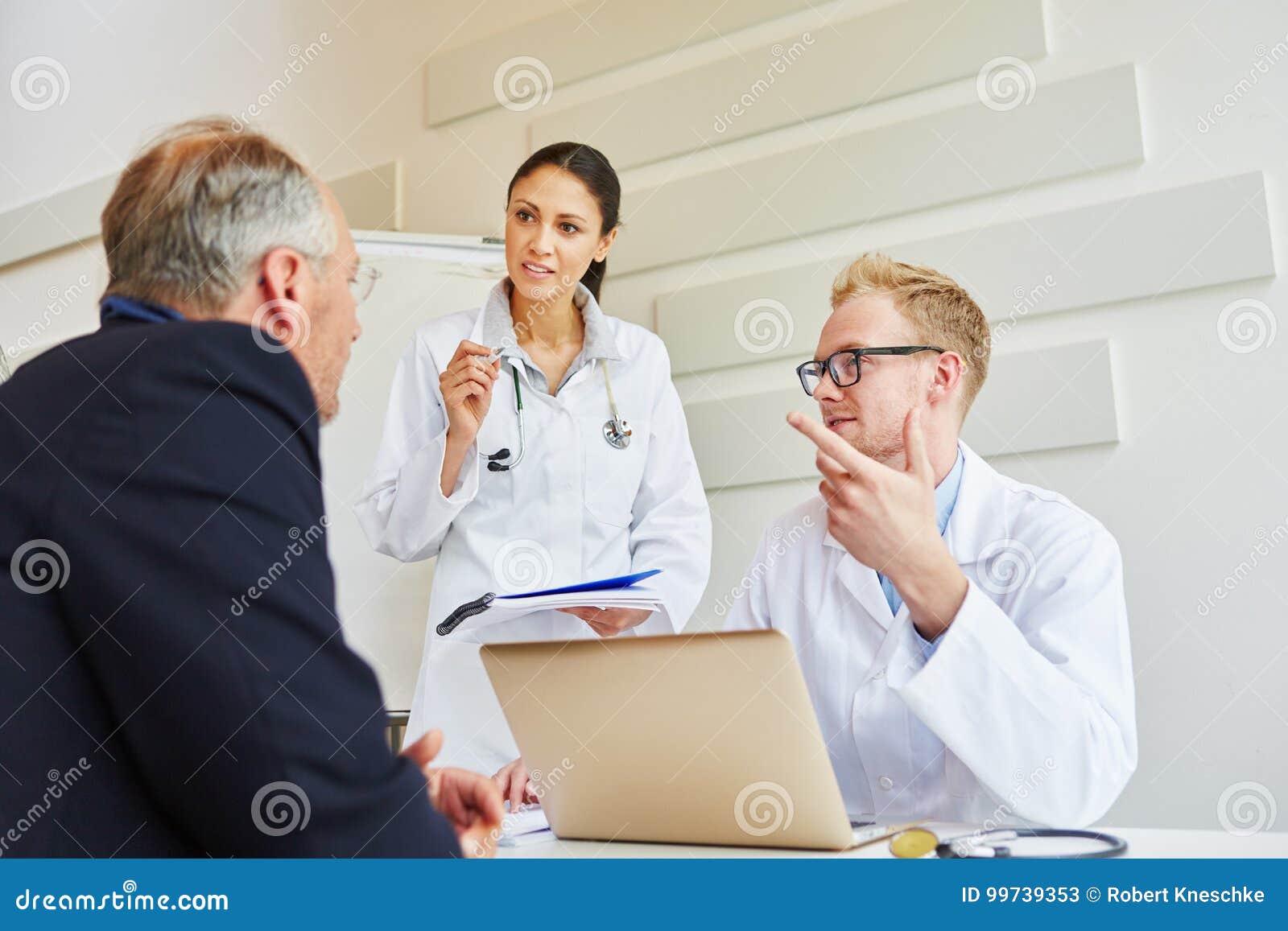 Doctors advicing patient stock image. Image of practitioner - 99739353