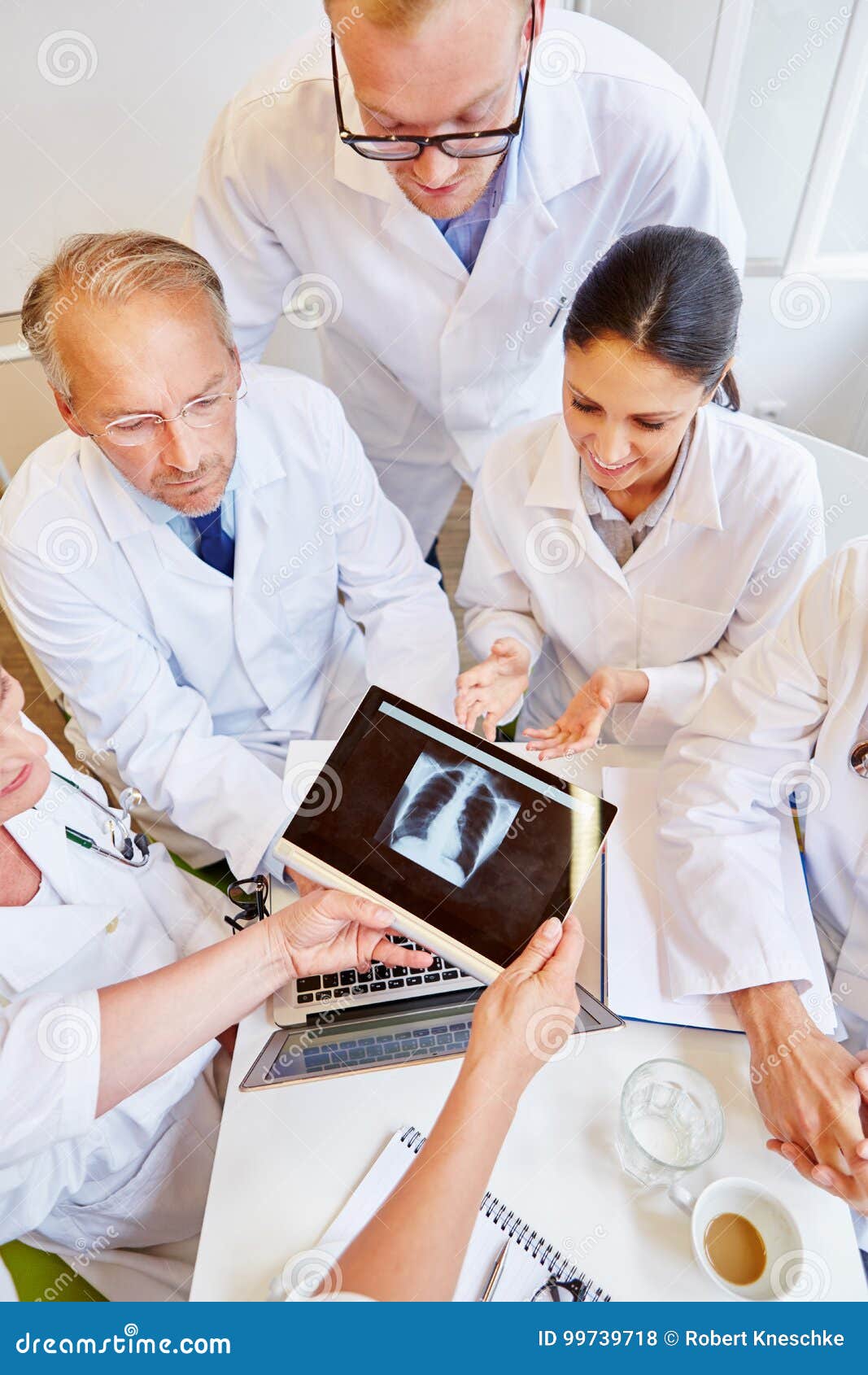 Doctors Analyzing X-ray Image Stock Photo - Image of therapists ...