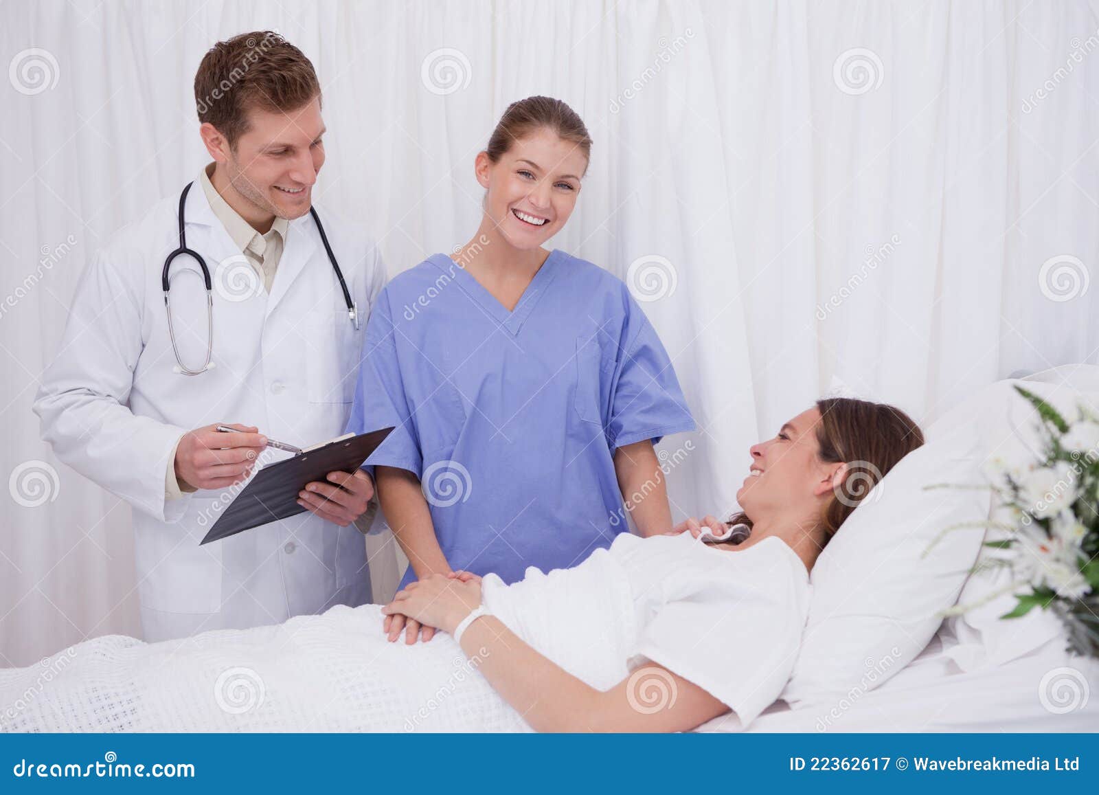 Doctors Bringing Good News To Patient Stock Image - Image of occupation ...