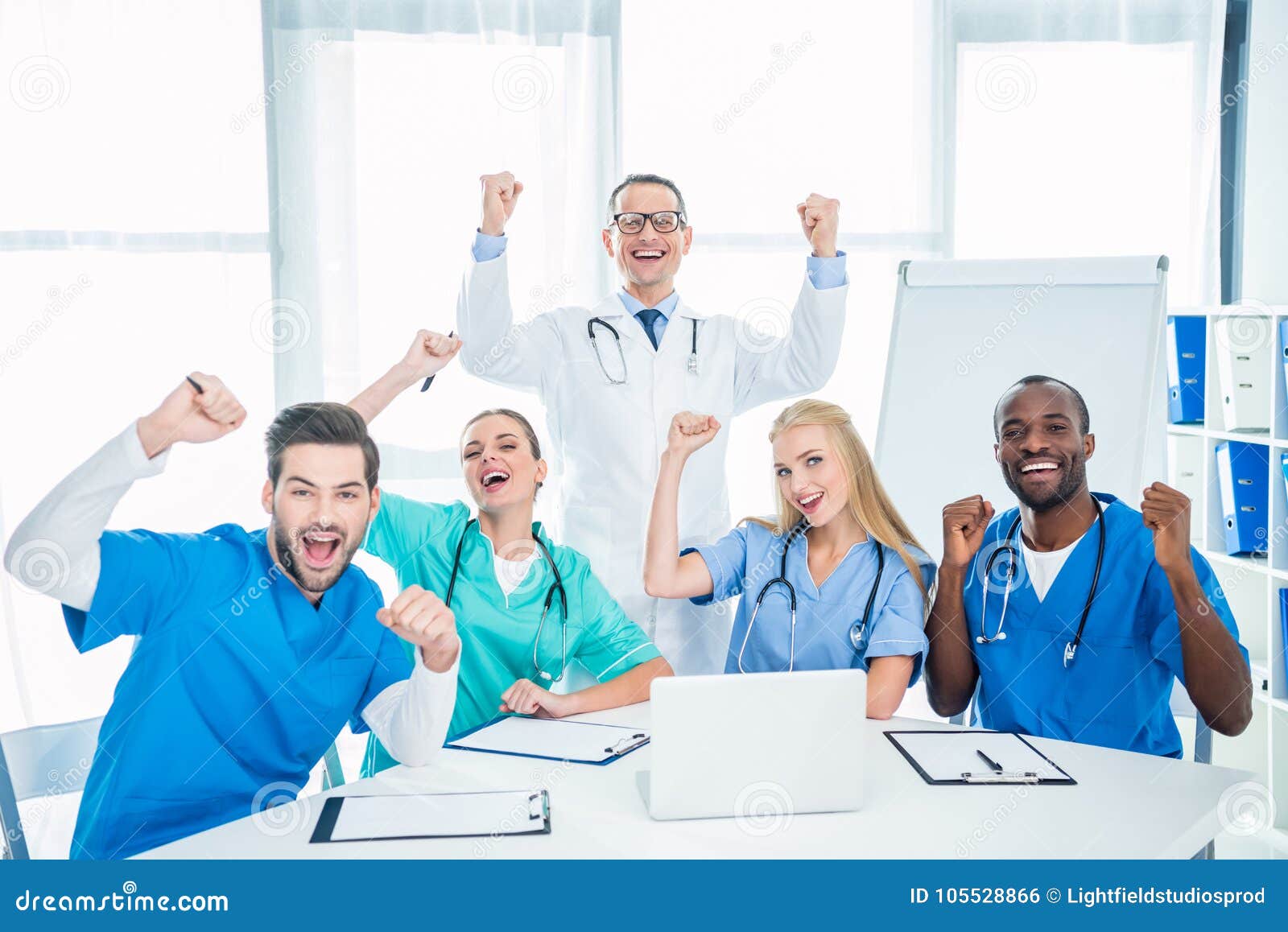 Doctors Celebrating Victory Stock Photo - Image of multicultural ... Doctors Celebrating Victory Stock Photo - Image of multicultural ...