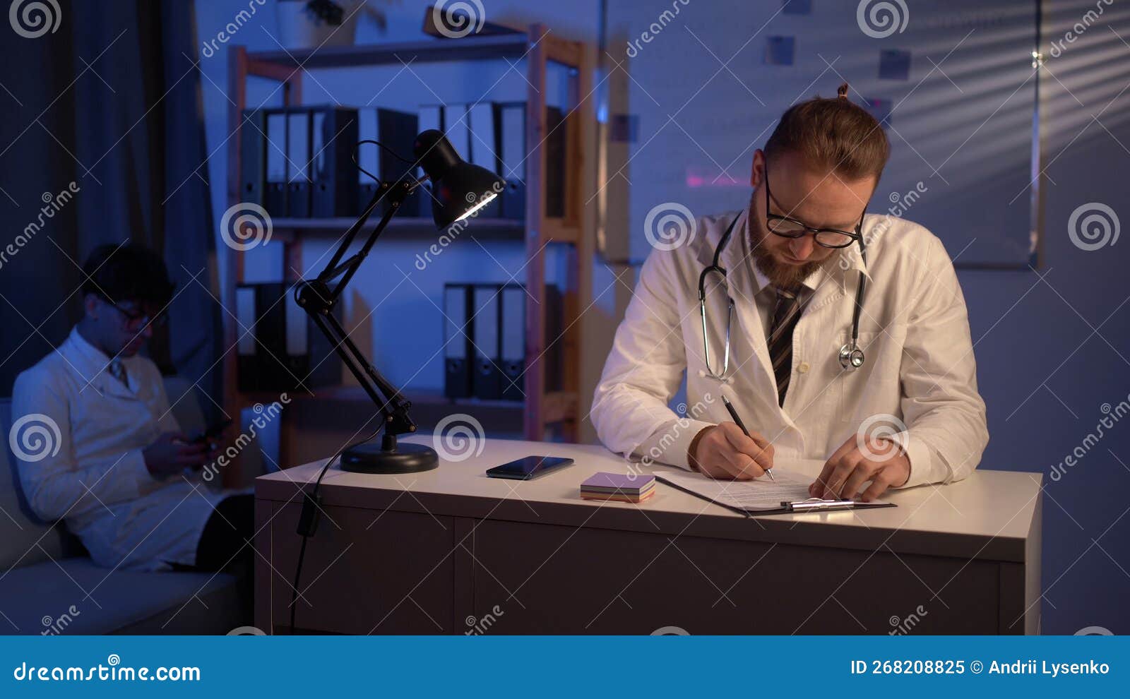 Doctors Colleagues in the Night Shift Working in the Hospital. Stock ...