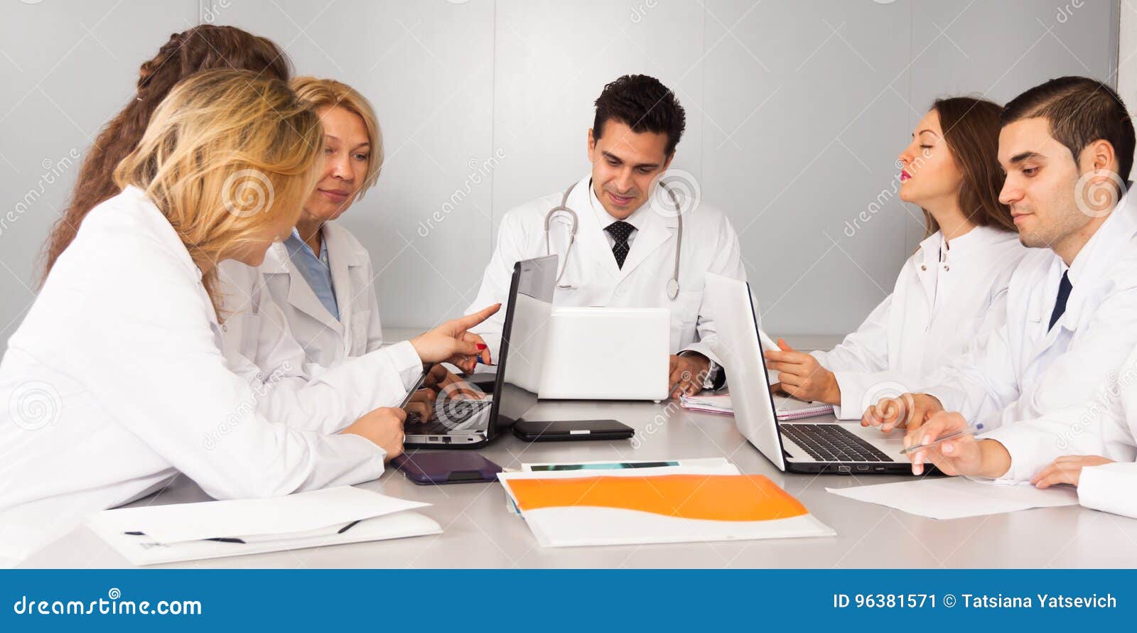 Doctors in conference room stock image. Image of interns - 96381571