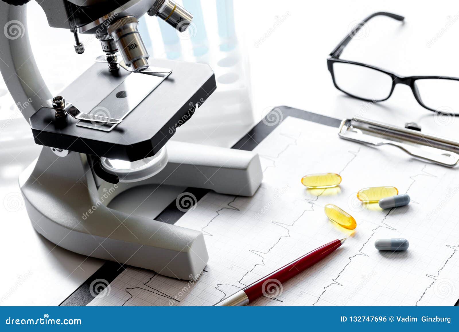 Doctors Desk with Microscope and Test Tubes Stock Photo - Image of ...
