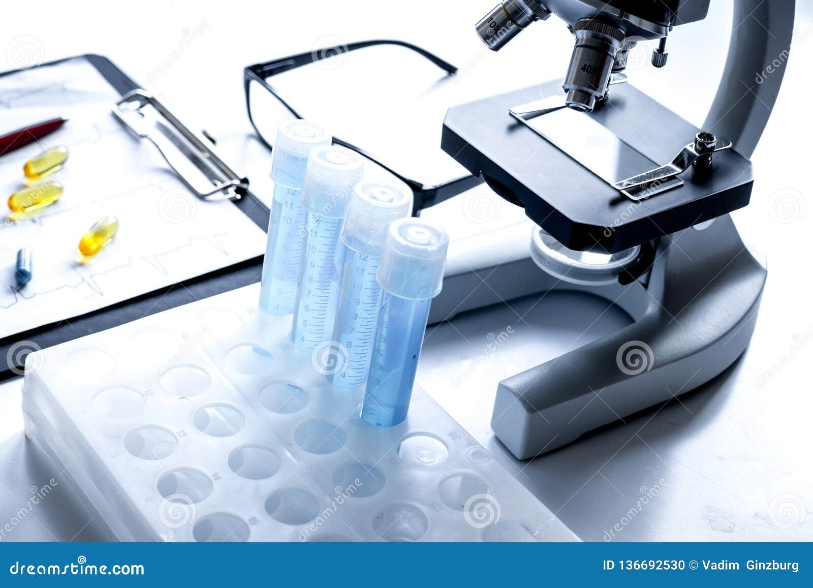 Doctors Desk with Microscope and Test Tubes Stock Photo - Image of ...