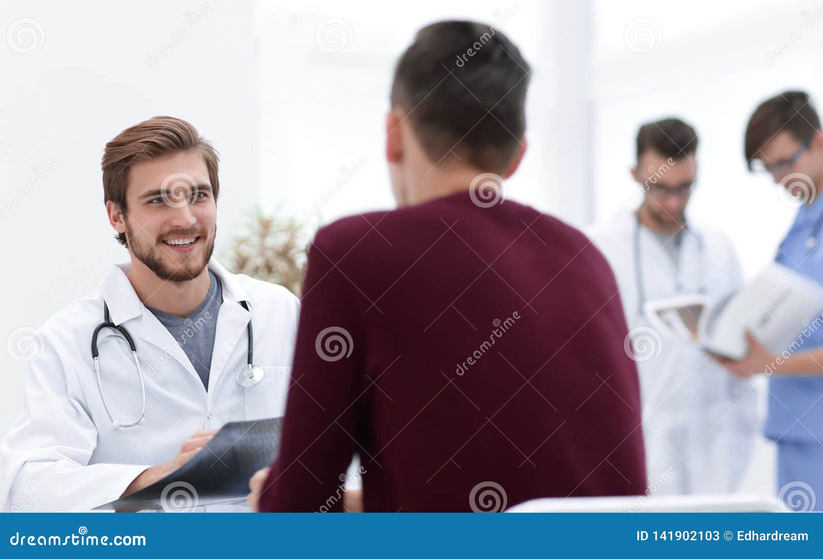 Doctors Discuss with the Patient the X-ray Stock Image - Image of ...