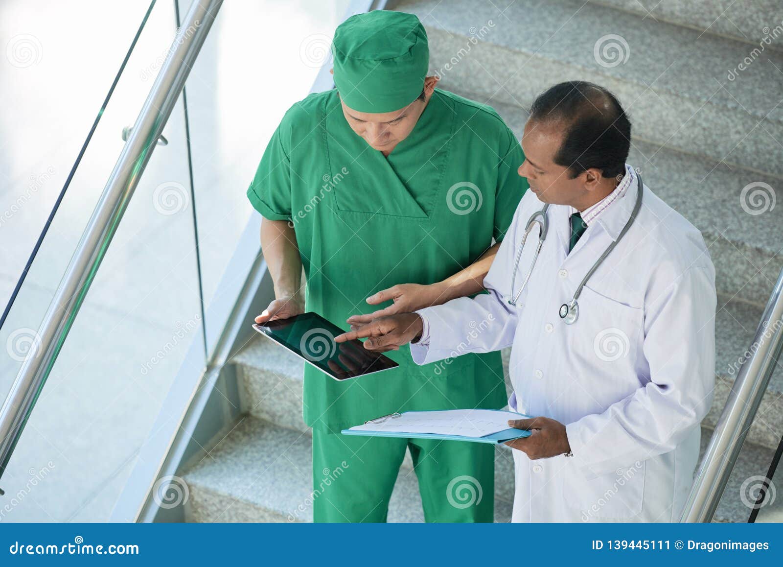 Doctors Discussing Difficult Case Stock Image - Image of indian ...