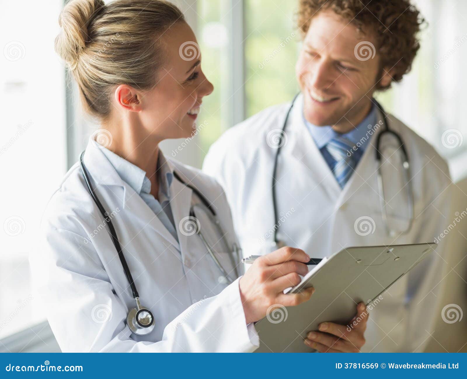 Doctors Discussing in Hospital Stock Image - Image of expert ...