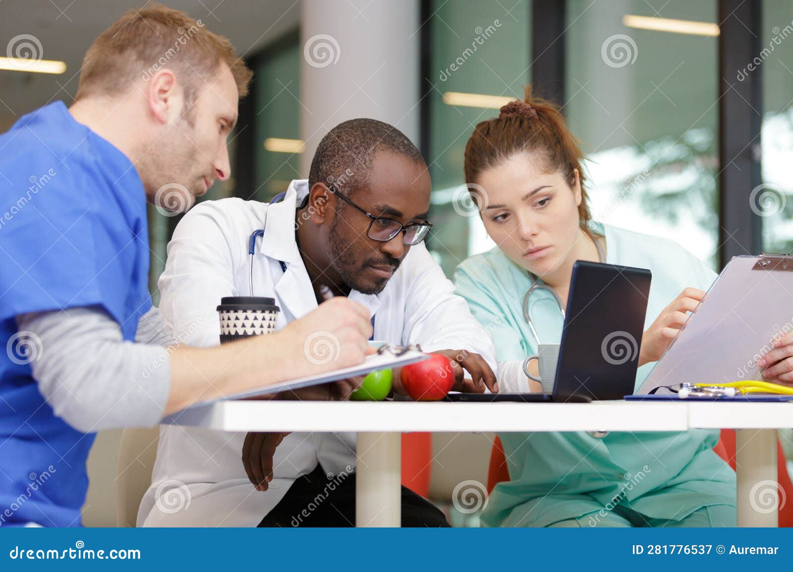 Doctors Discussing Ideas during Lunch Break Stock Image - Image of ...