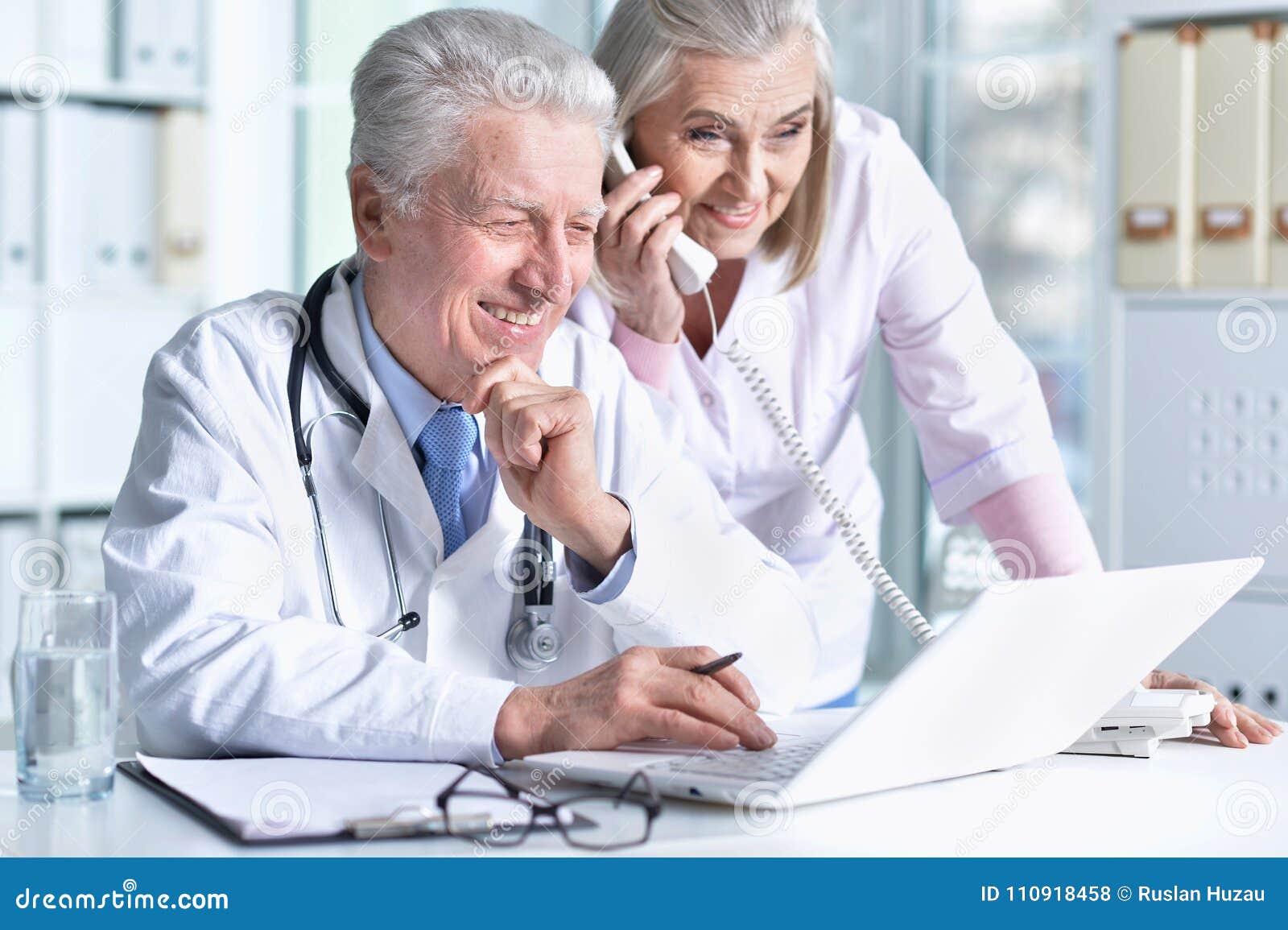 Doctors Discussing Something Stock Photo - Image of health, posing ...
