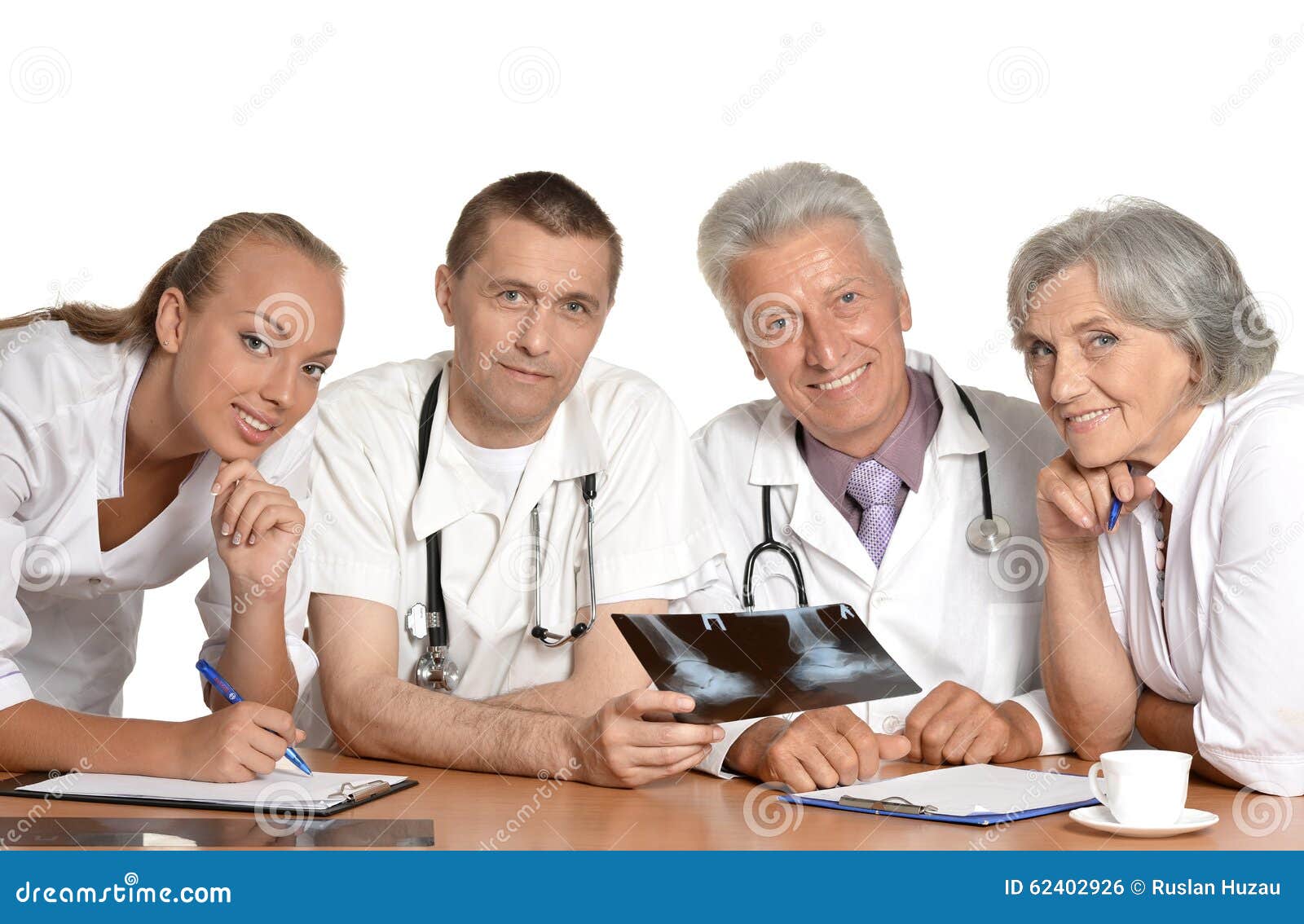 Doctors Discussing at Table Stock Photo - Image of computer ...